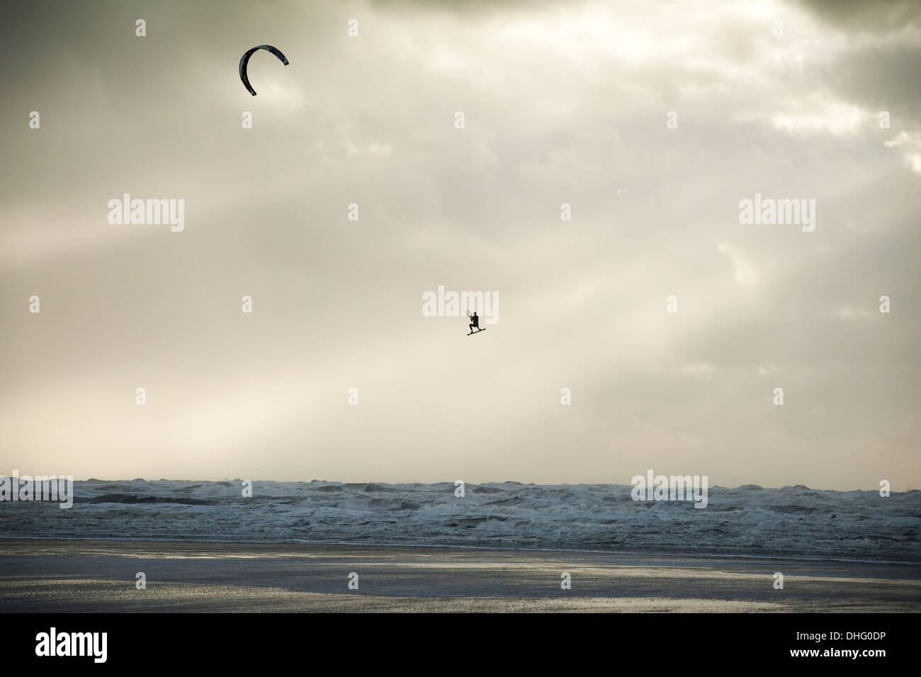 Kite surfer flying through the air Stock Photo - Alamy