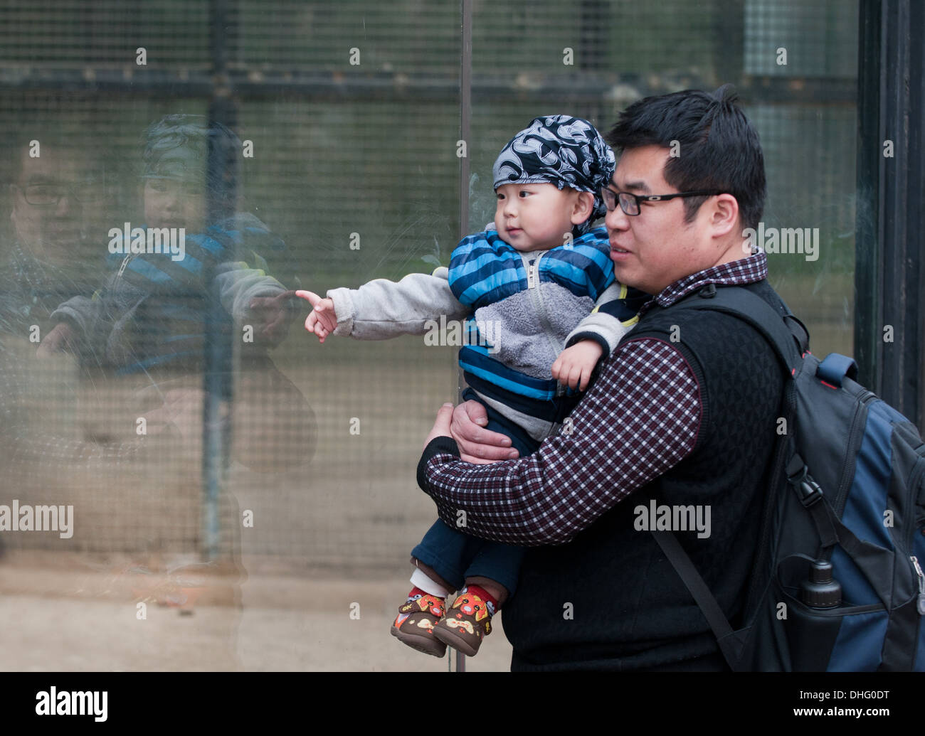 Father with his child in Beijing Zoo in Xicheng District, Beijing ...