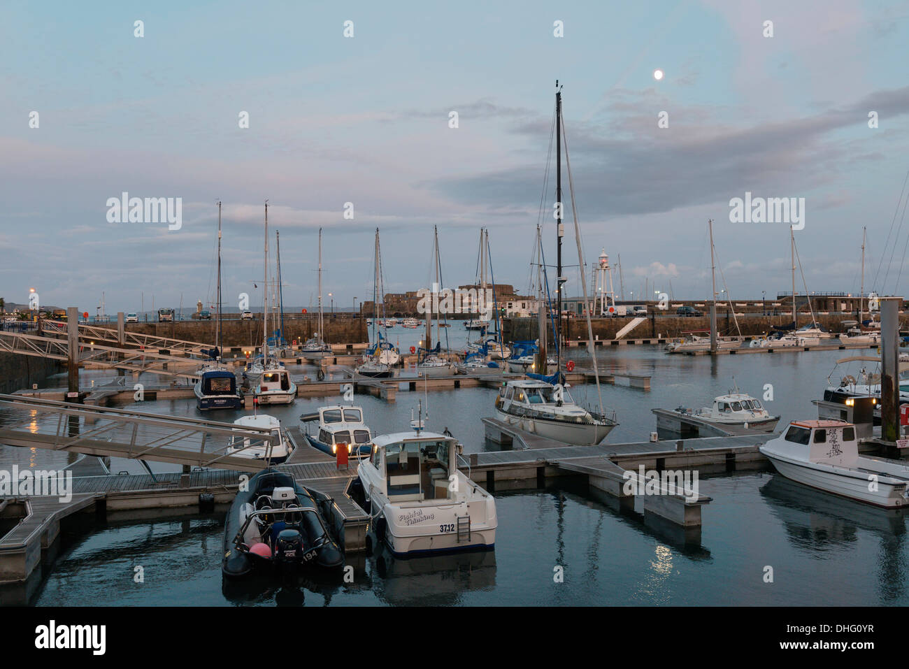 St peter port harbour guernsey sunset hi-res stock photography and ...