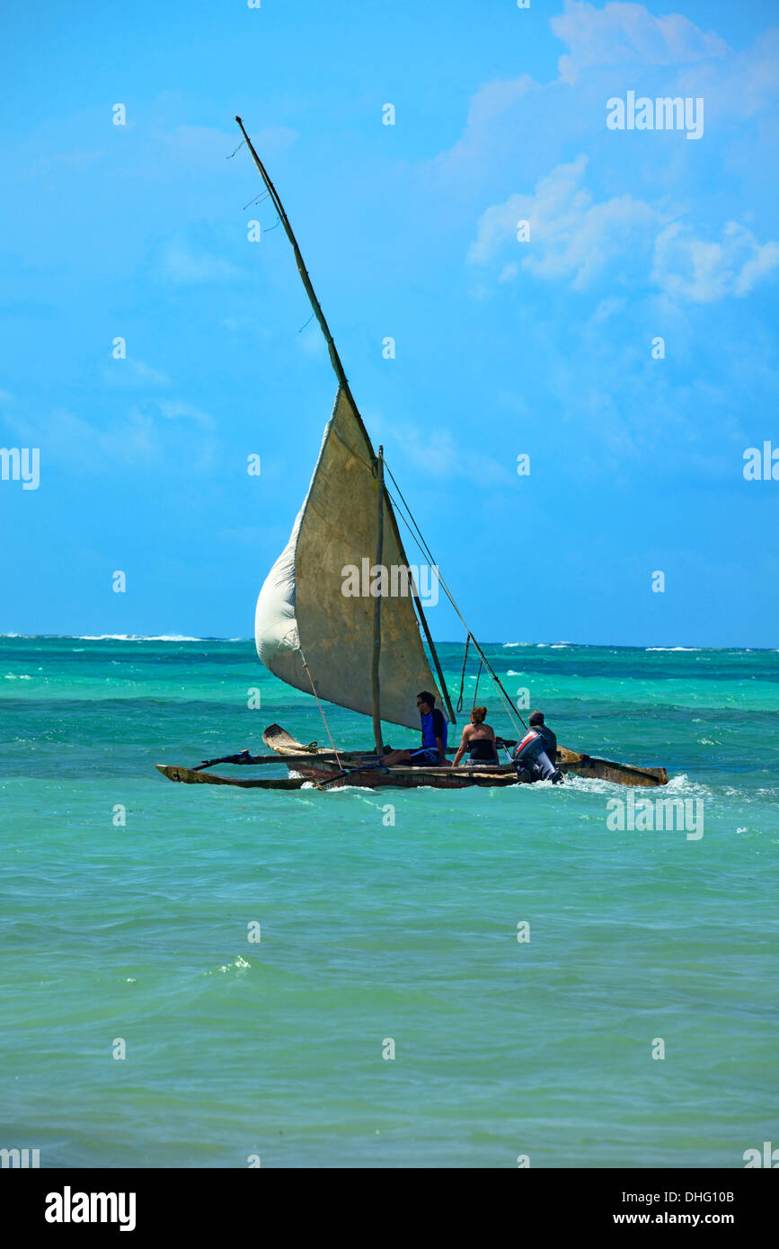 Tourist on a traditional Dhow sailing boat, Bwejuu Beach, Indian Ocean ...