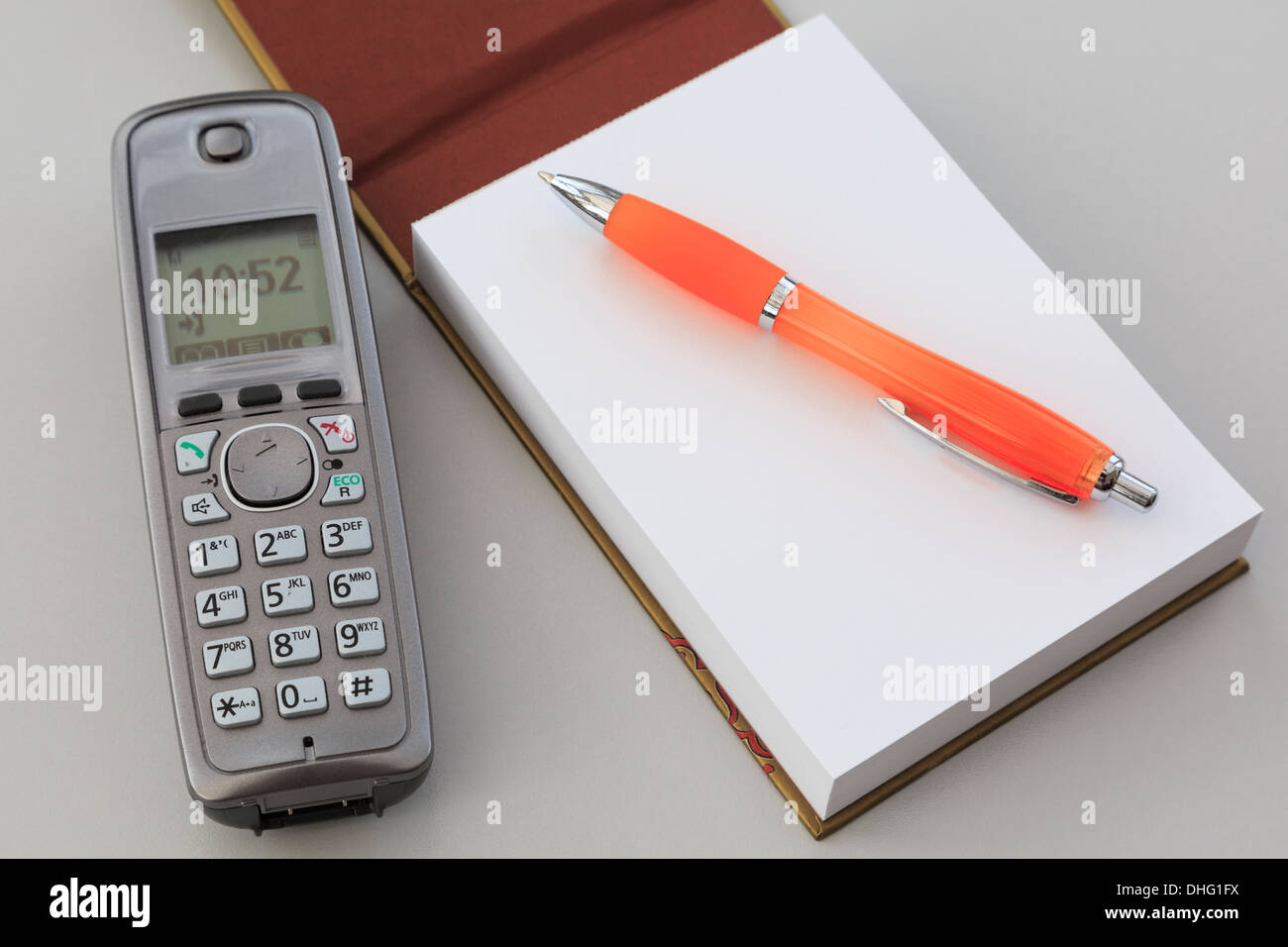 Open notebook page on orange background hi-res stock photography and ...