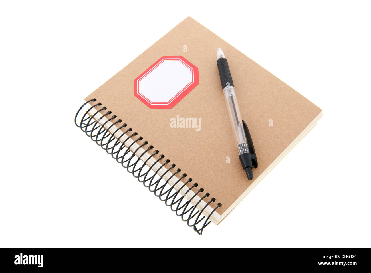 paper notebook with pencil isolated over white background Stock Photo ...