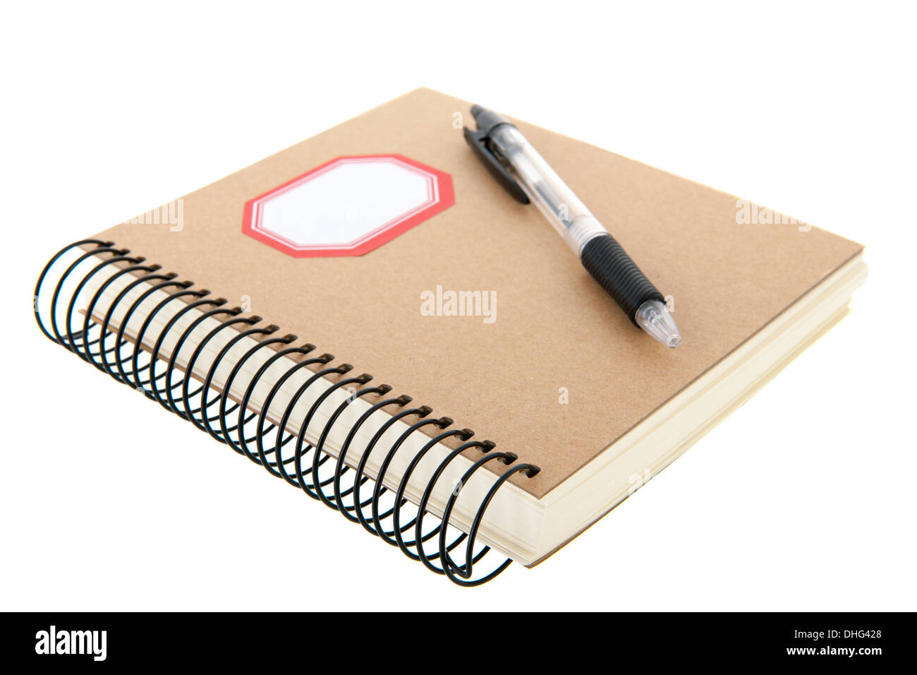 paper notebook with pencil isolated over white background Stock Photo ...