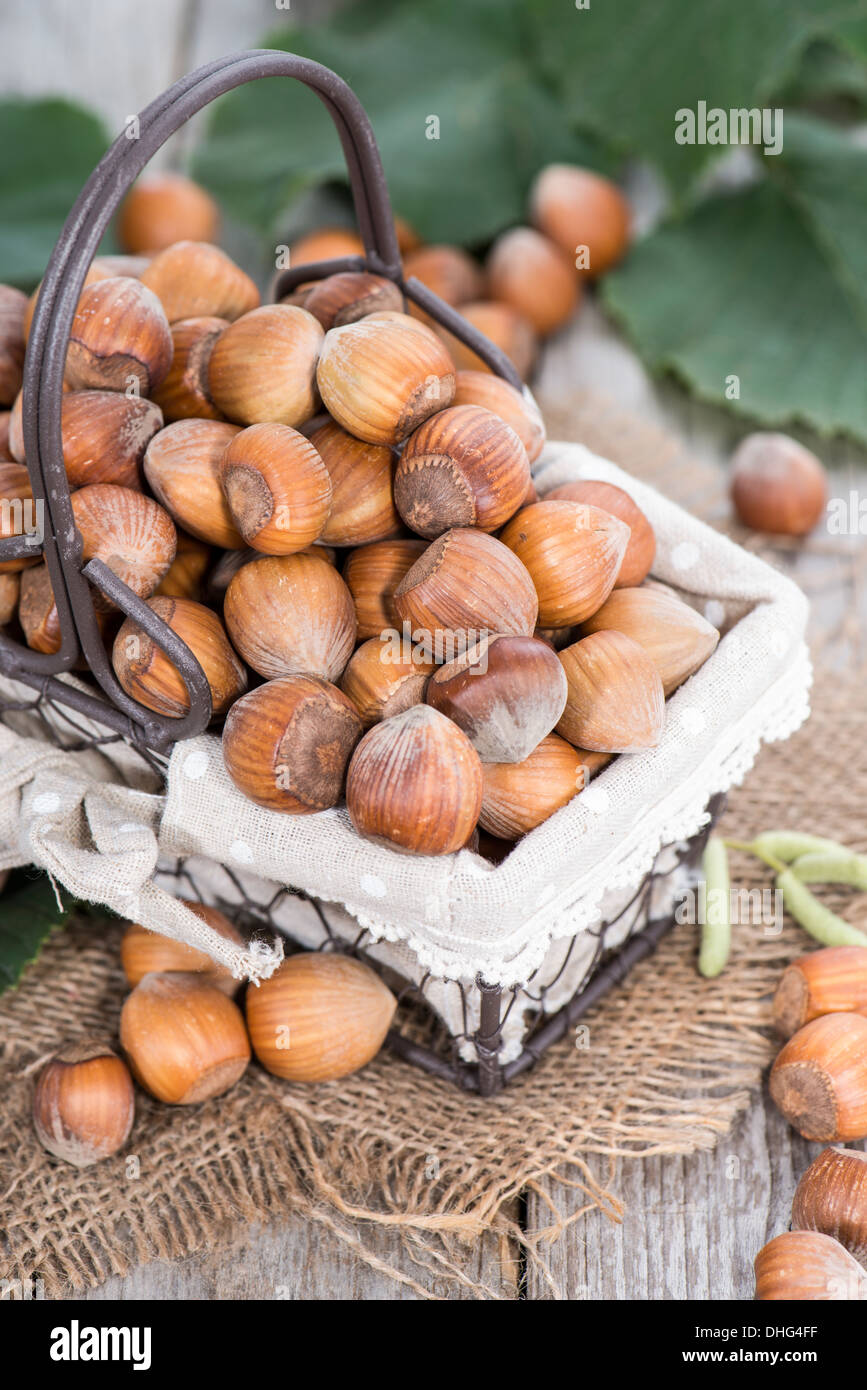 Some fresh Hazelnuts on wood Stock Photo - Alamy