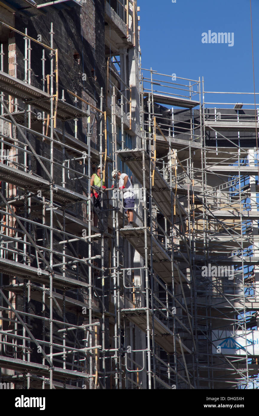construction site workers edifice building Stock Photo - Alamy