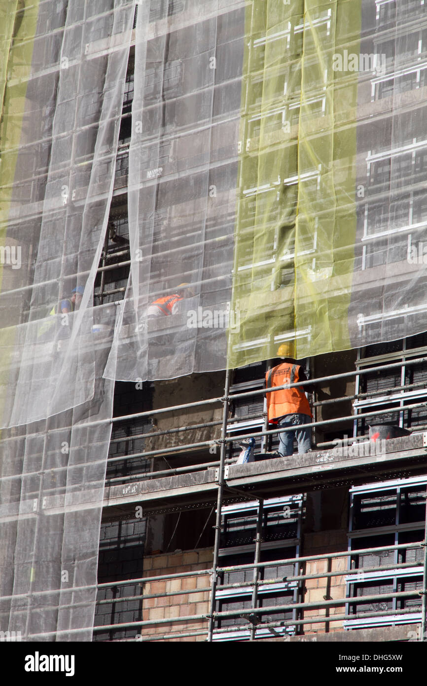 construction site workers edifice building Stock Photo - Alamy