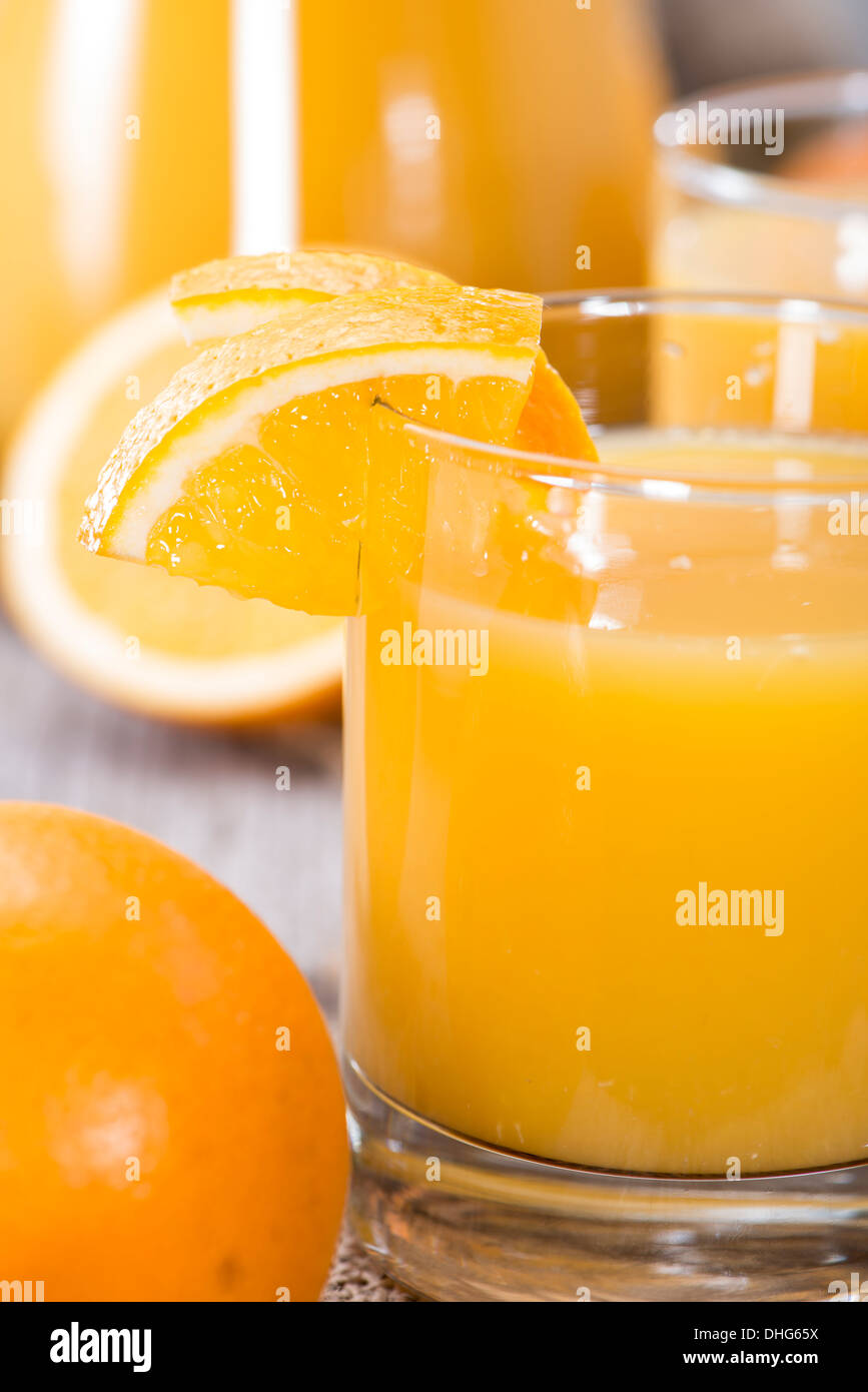Portion of fresh made Orange Juice (with fruits Stock Photo - Alamy