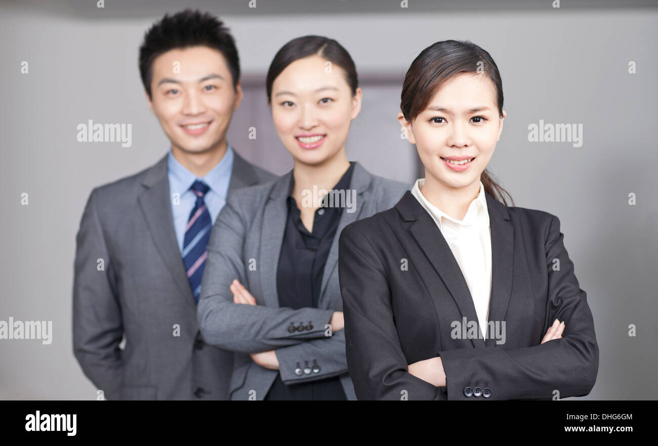 young office workers with hands crossed indoors,portrait Stock Photo ...