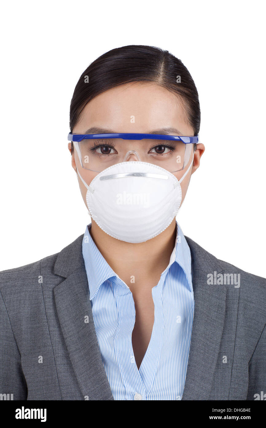 Portrait of a woman wearing a face mask Stock Photo - Alamy