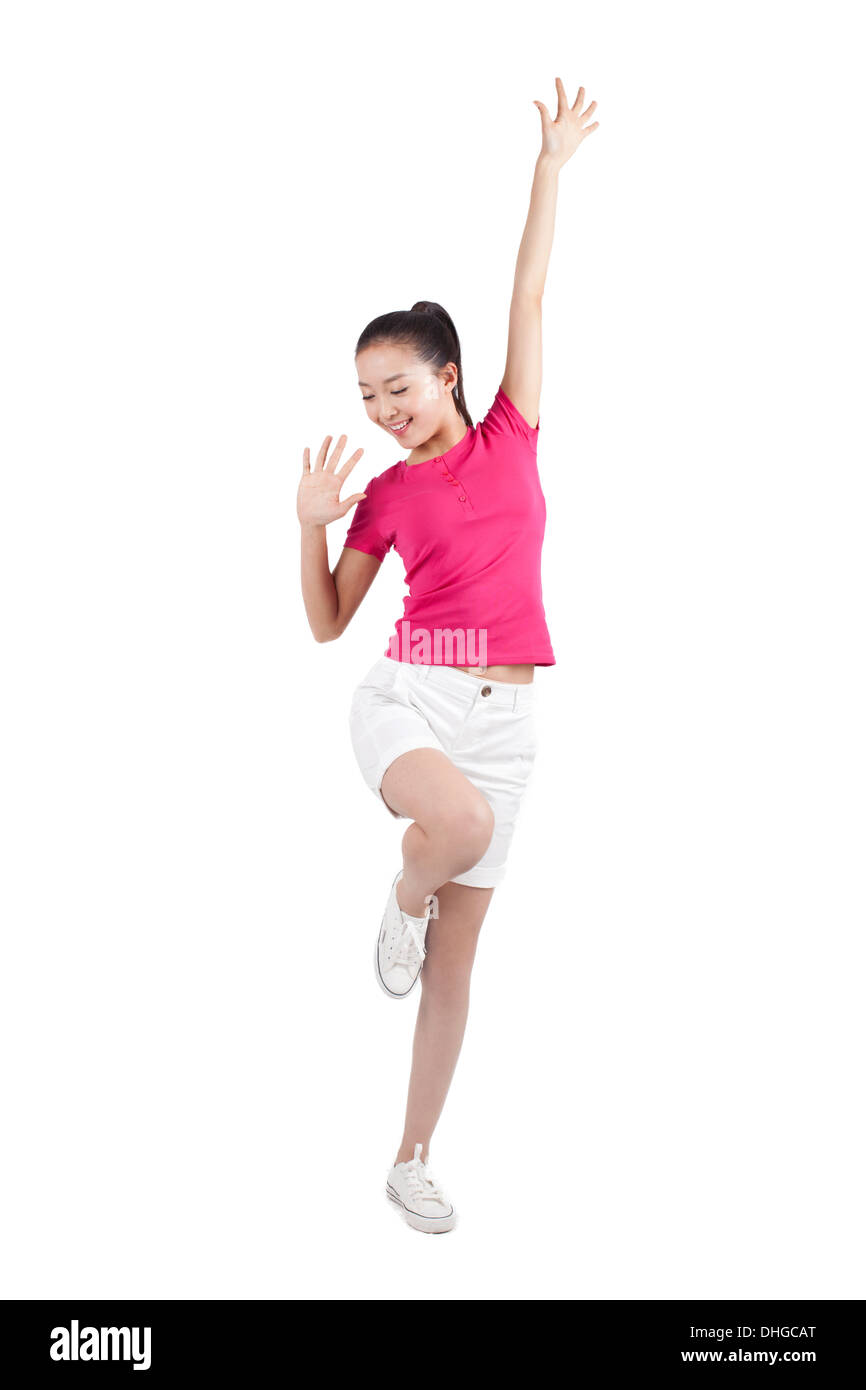 Young woman dancing,smiling Stock Photo - Alamy