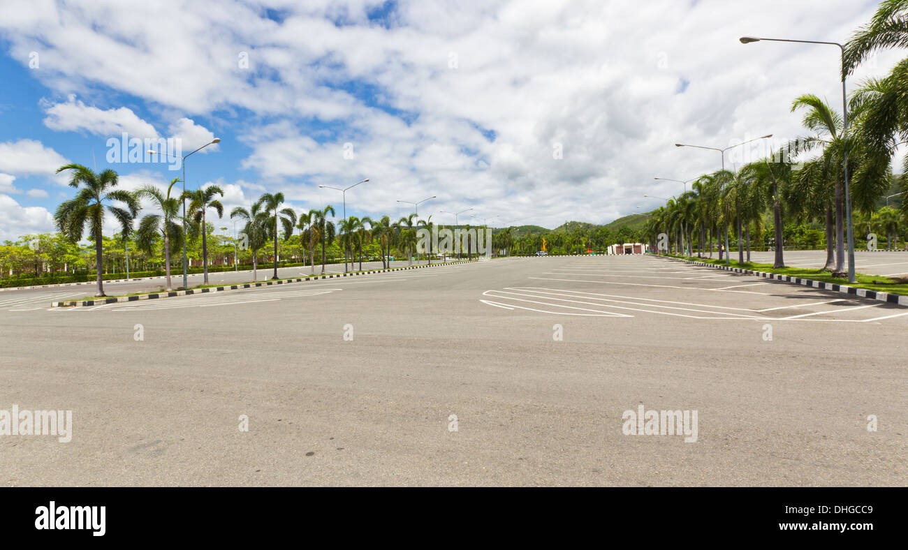 Large Parking Lot with White Cloud and Blue Sky Background in a Bright ...