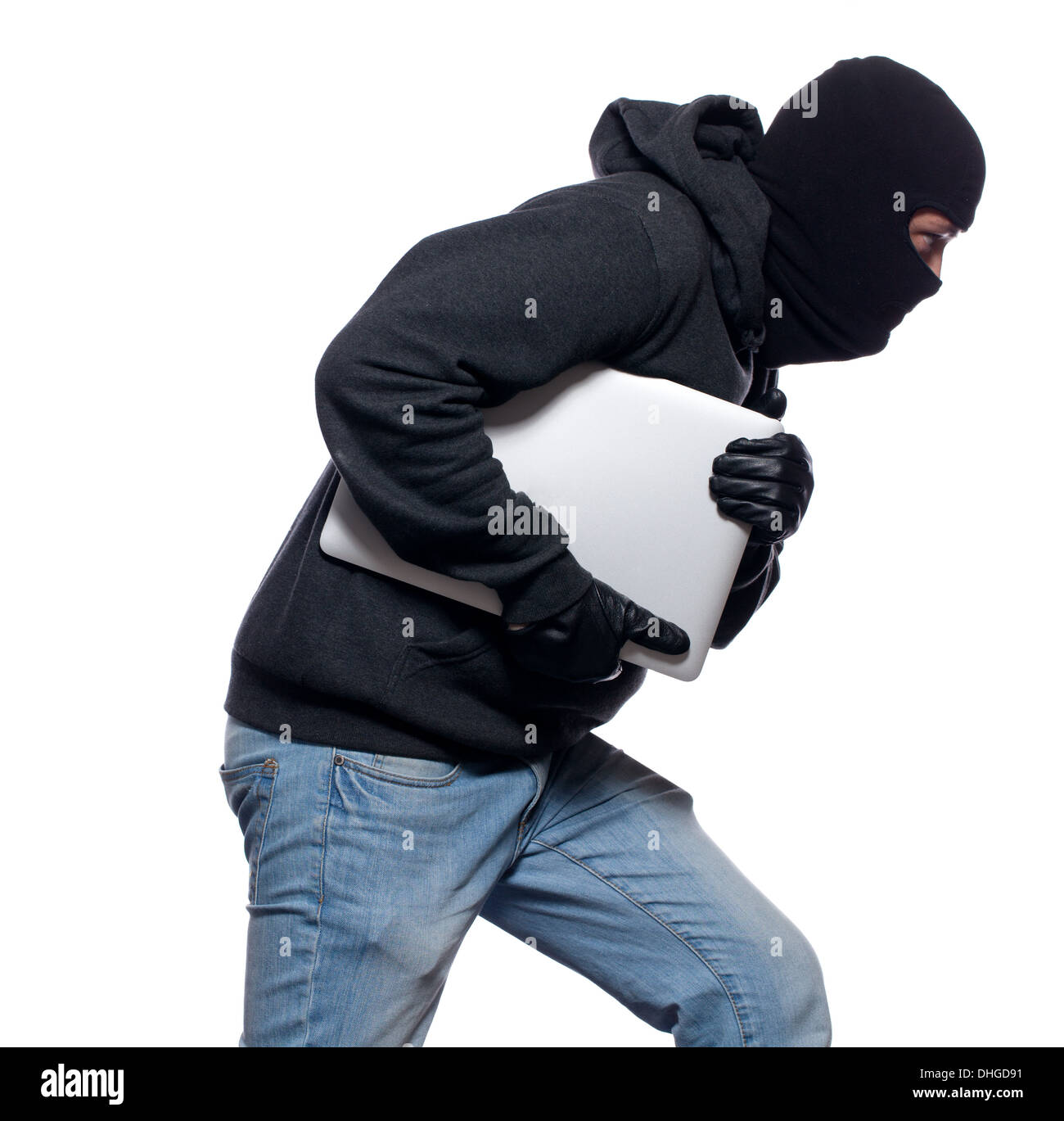 Thief stealing a laptop computer Stock Photo - Alamy Thief stealing a laptop computer Stock Photo - Alamy