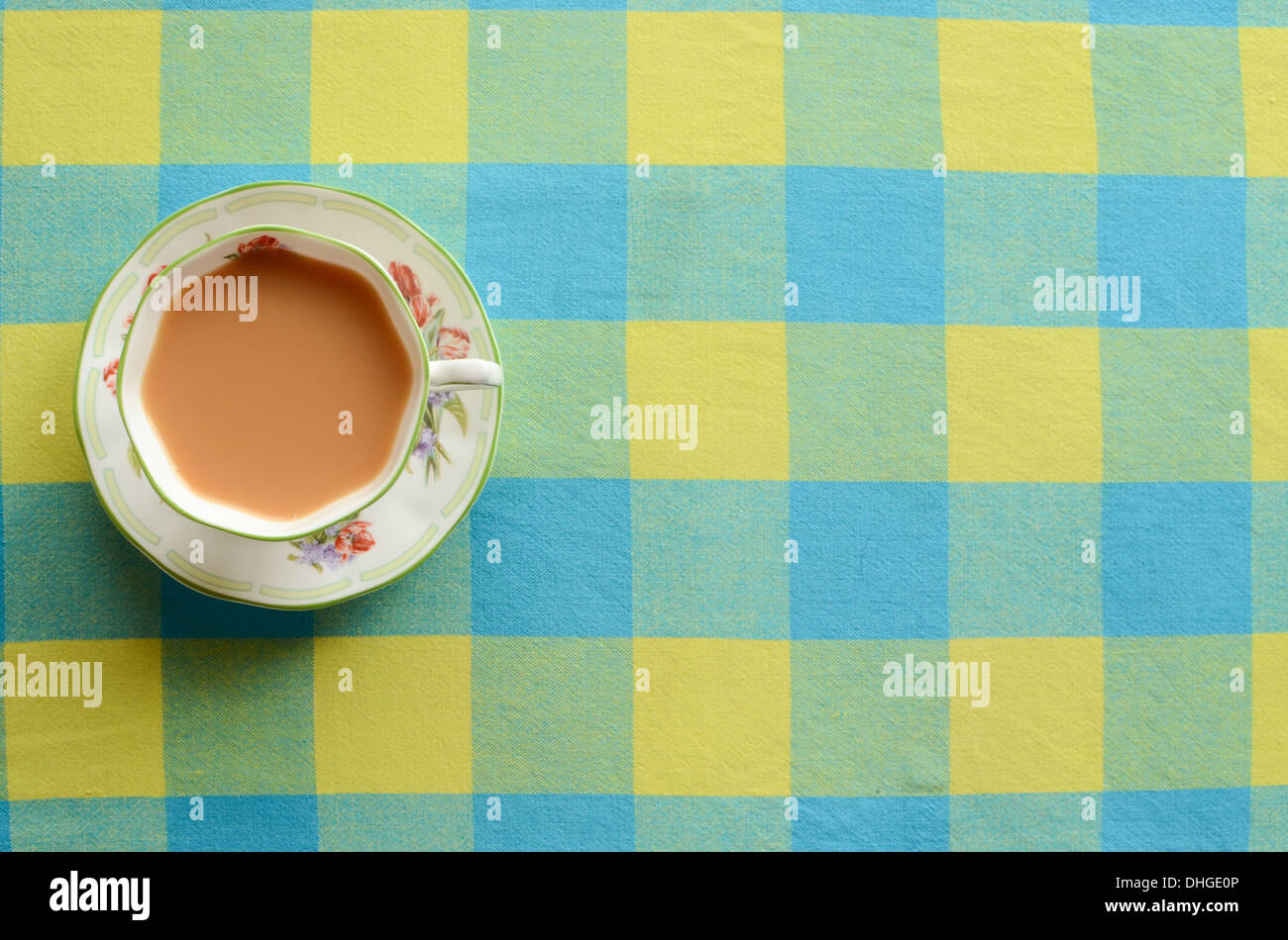 A Cup Of Milk Tea On A Chequered Tablecloth Stock Photo Alamy a-cup-of-milk-tea-on-a-chequered-tablecloth-stock-photo-alamy