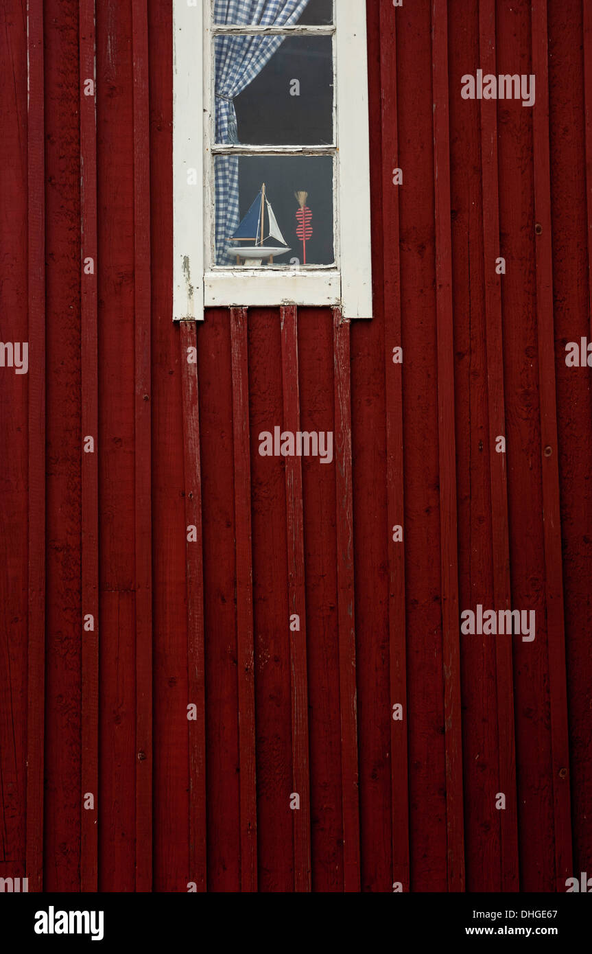 Colourful wooden huts along the jetty (quay) at Smogen. Bohuslan ...