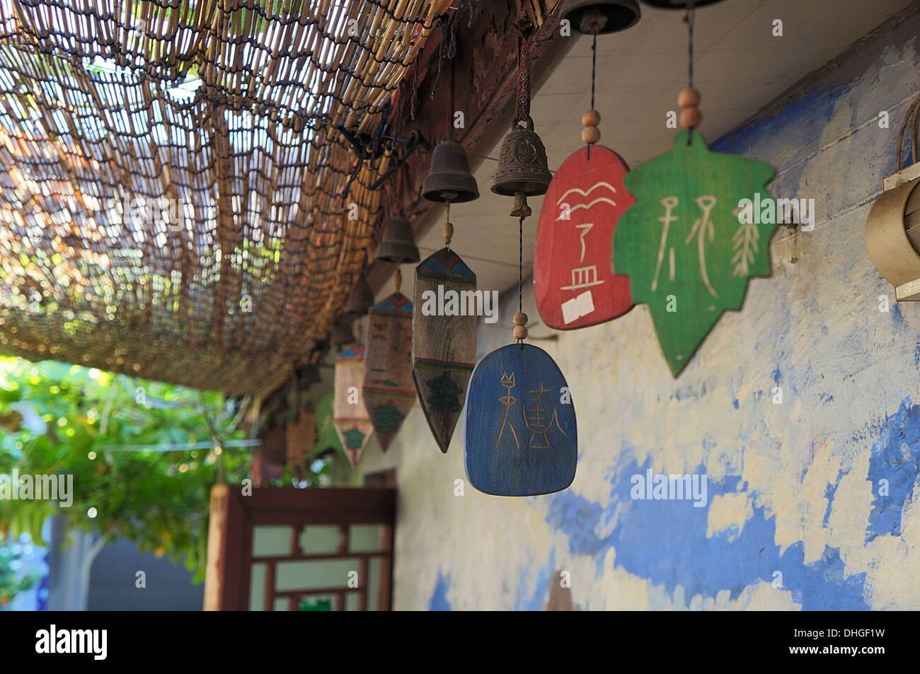 Trinkets hanging from the roof in a hostel, Beijing, China Stock Photo ...
