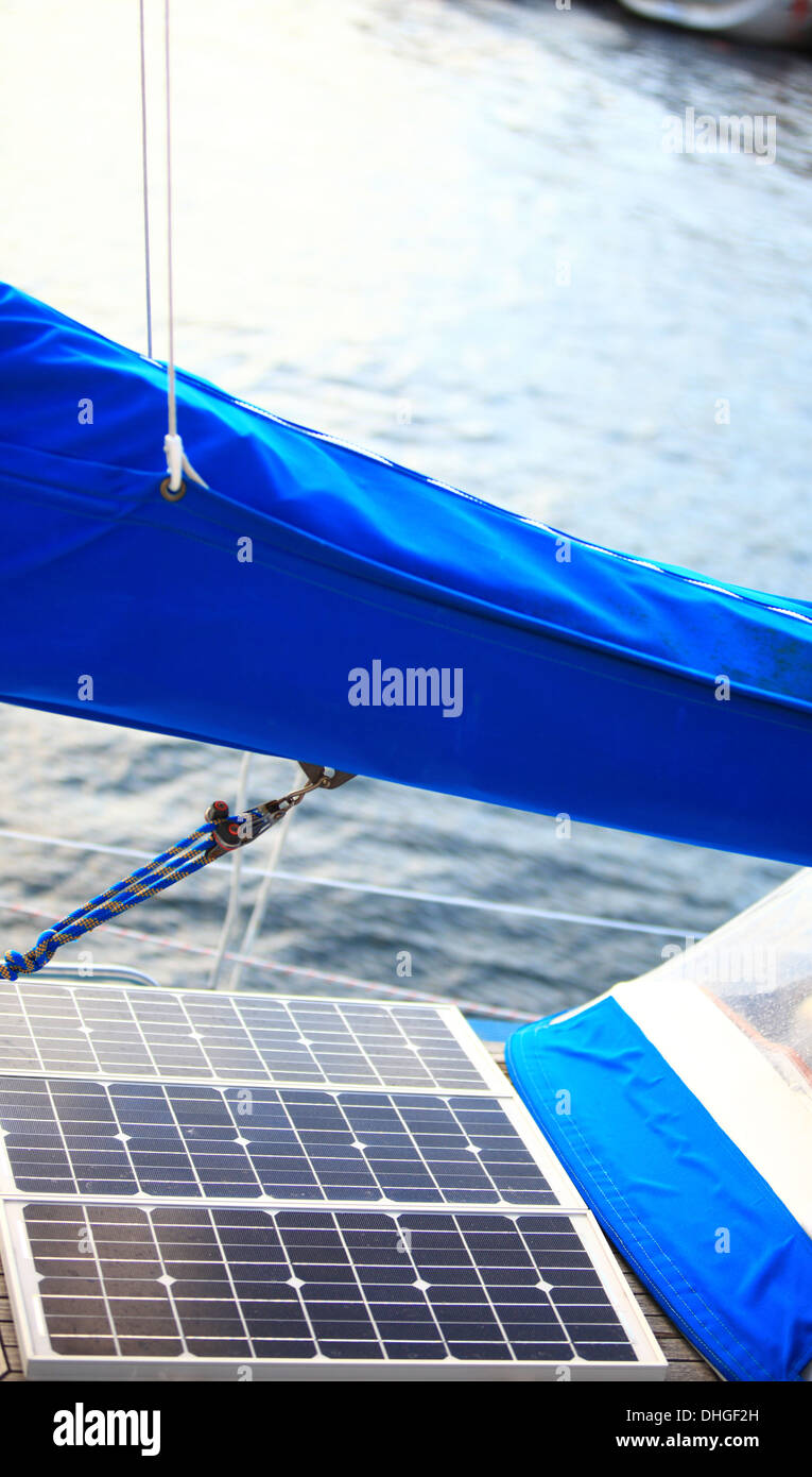 Solar charging batteries aboard a sail boat. Photovoltaic panels ...