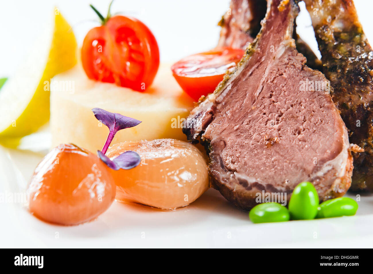 Stewed mutton with green string bean on a white plate Stock Photo - Alamy