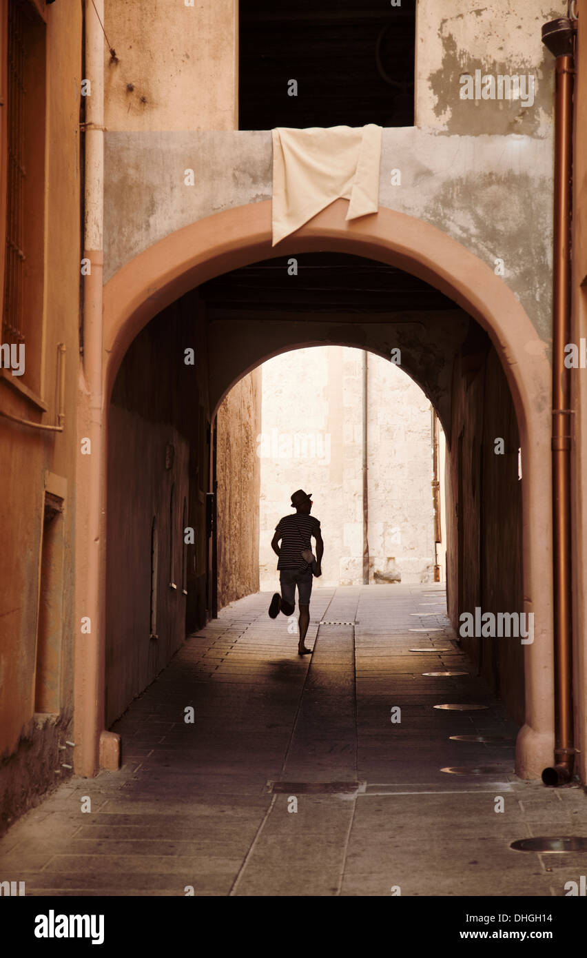 Man and arch hi-res stock photography and images - Alamy