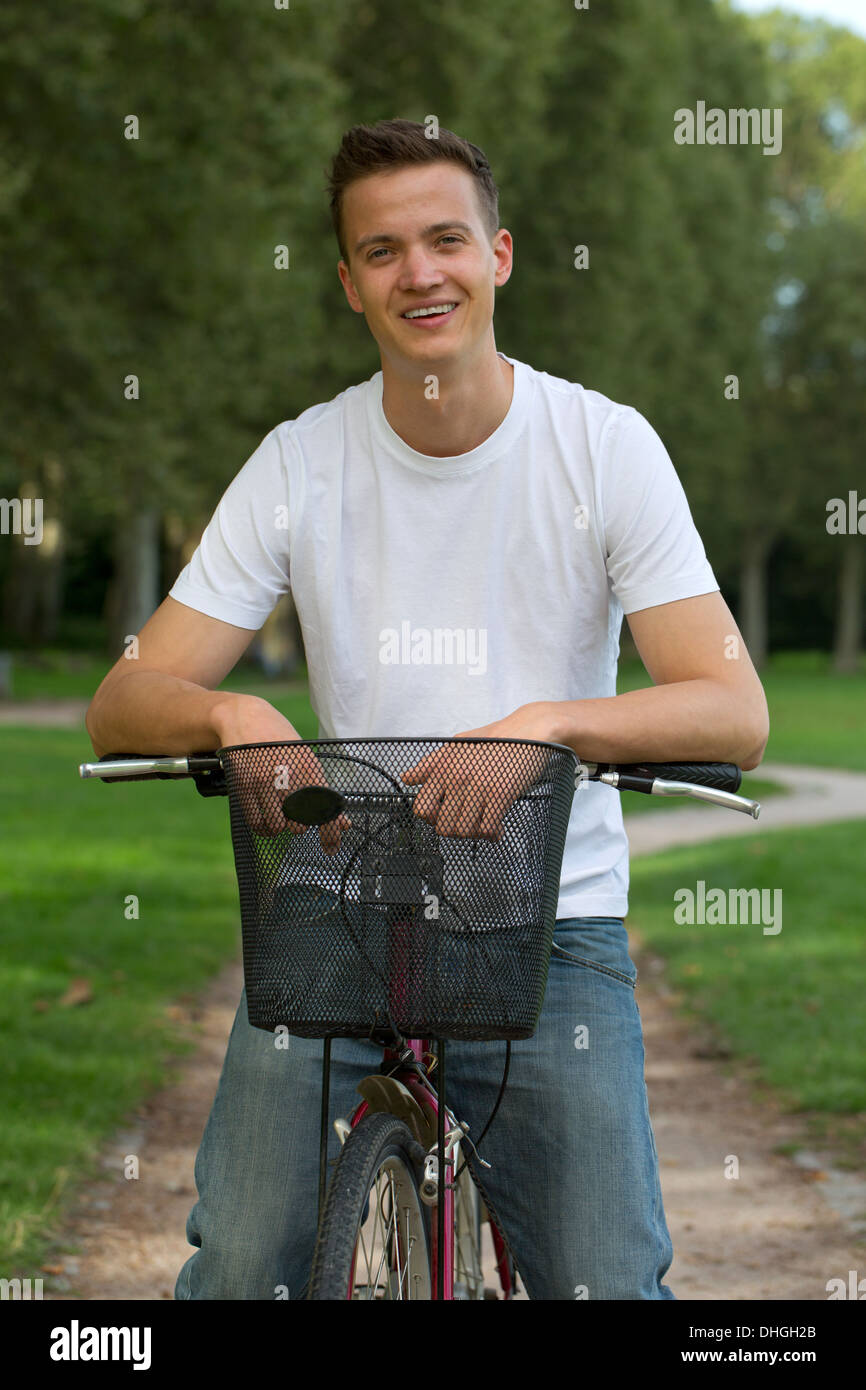 Man ride cycle in park hi-res stock photography and images - Alamy