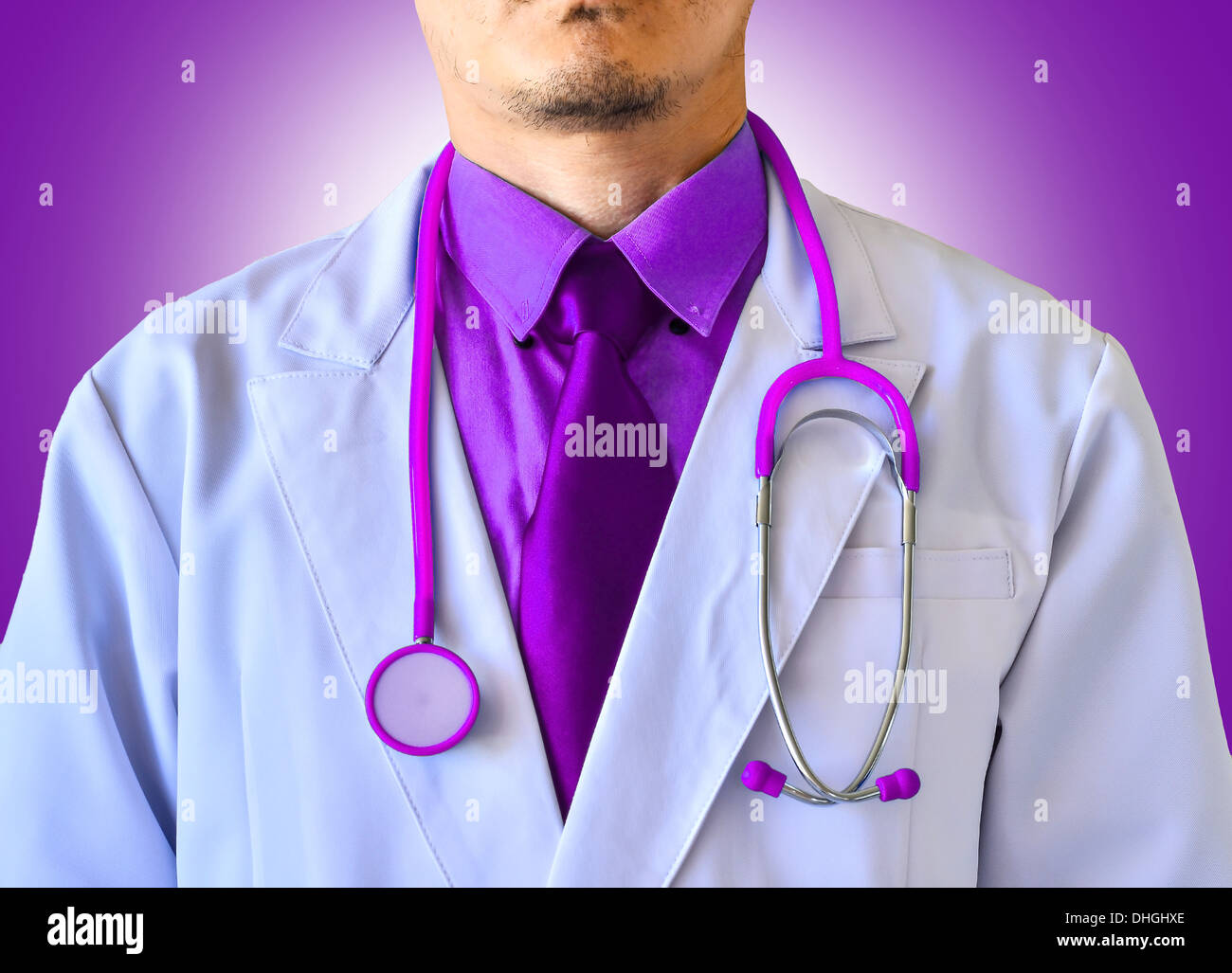Doctor with a stethoscope close up on violet background Stock Photo - Alamy