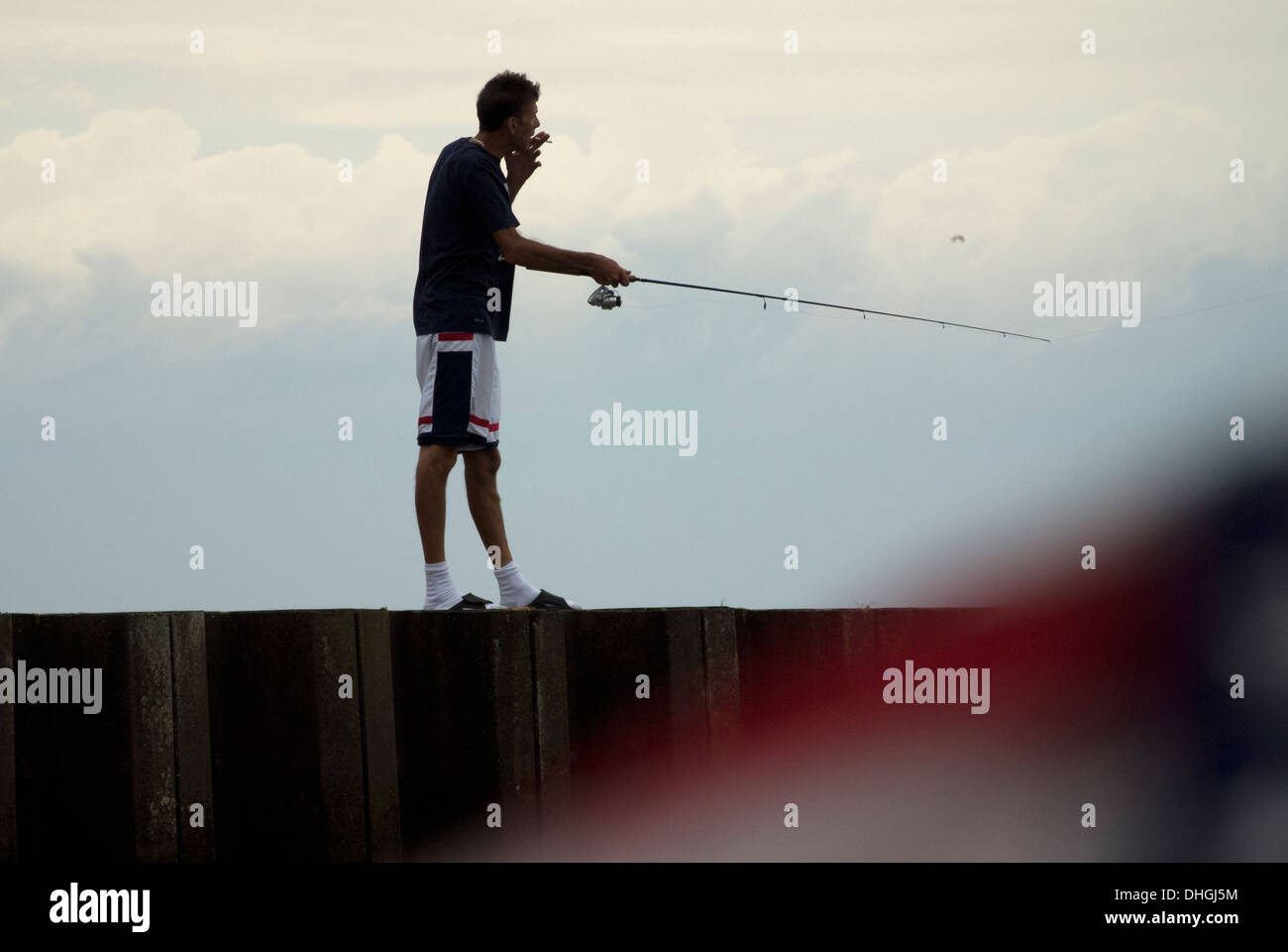 Fishing on Sodus Bay pier Stock Photo - Alamy