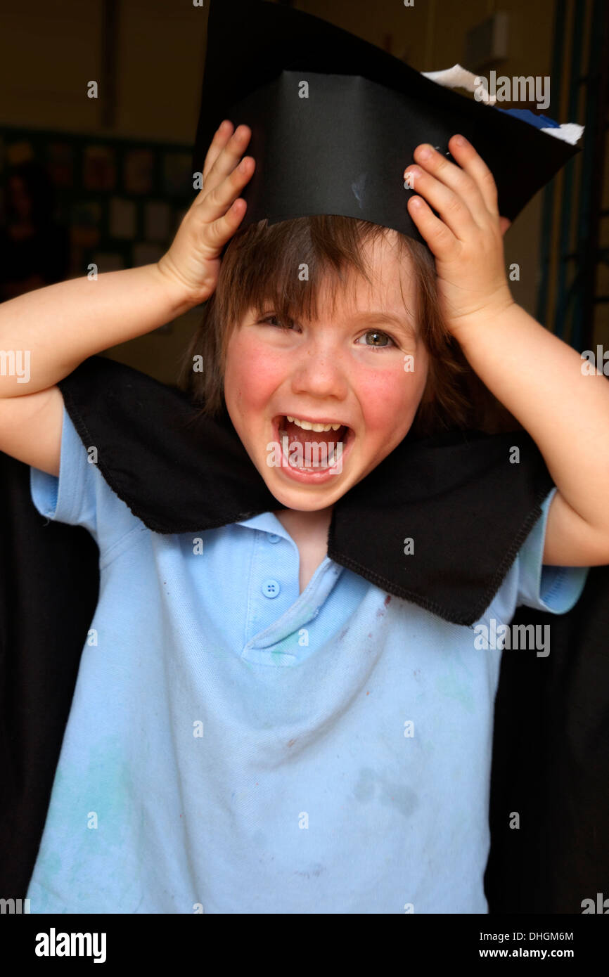 Celebrating ,mortar board, celebration, boy, graduation Stock Photo - Alamy