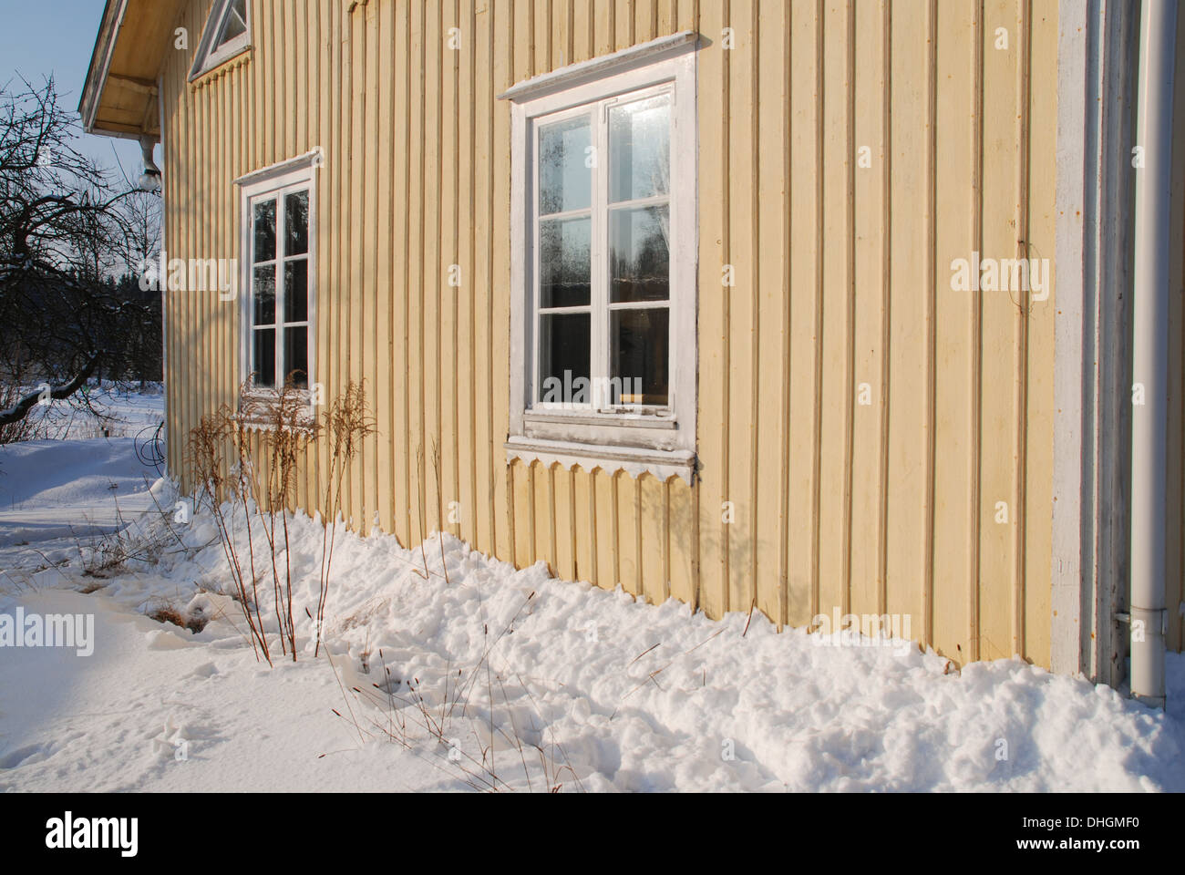 Yellow wood house wall Stock Photo - Alamy