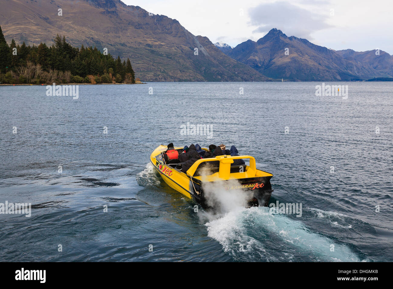 Tourists on Kawarau Jet Jetboat ride on Lake Wakatipu in Queenstown ...