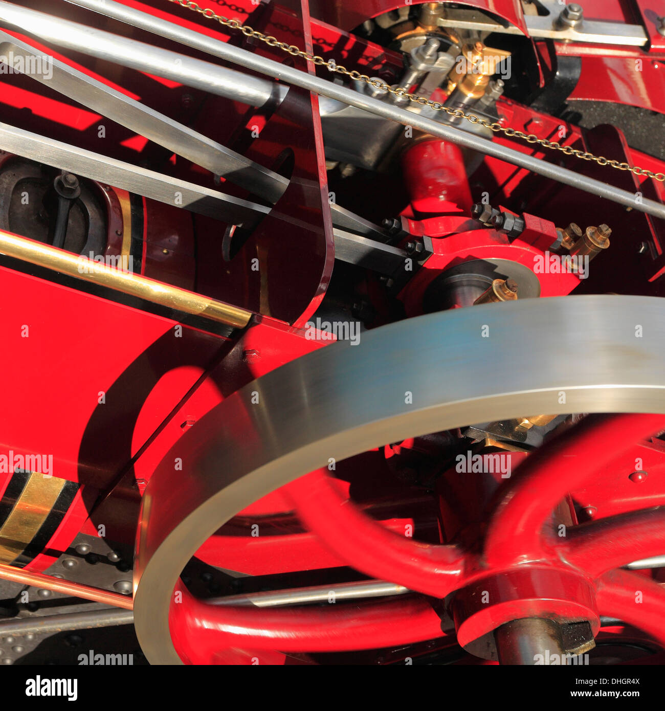 The working machinery of a red painted steam engine Stock Photo - Alamy