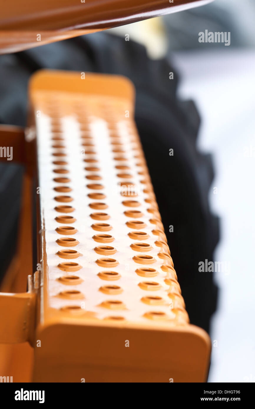 Ladder into giant earth mover construction vehicle. Step of truck car ...