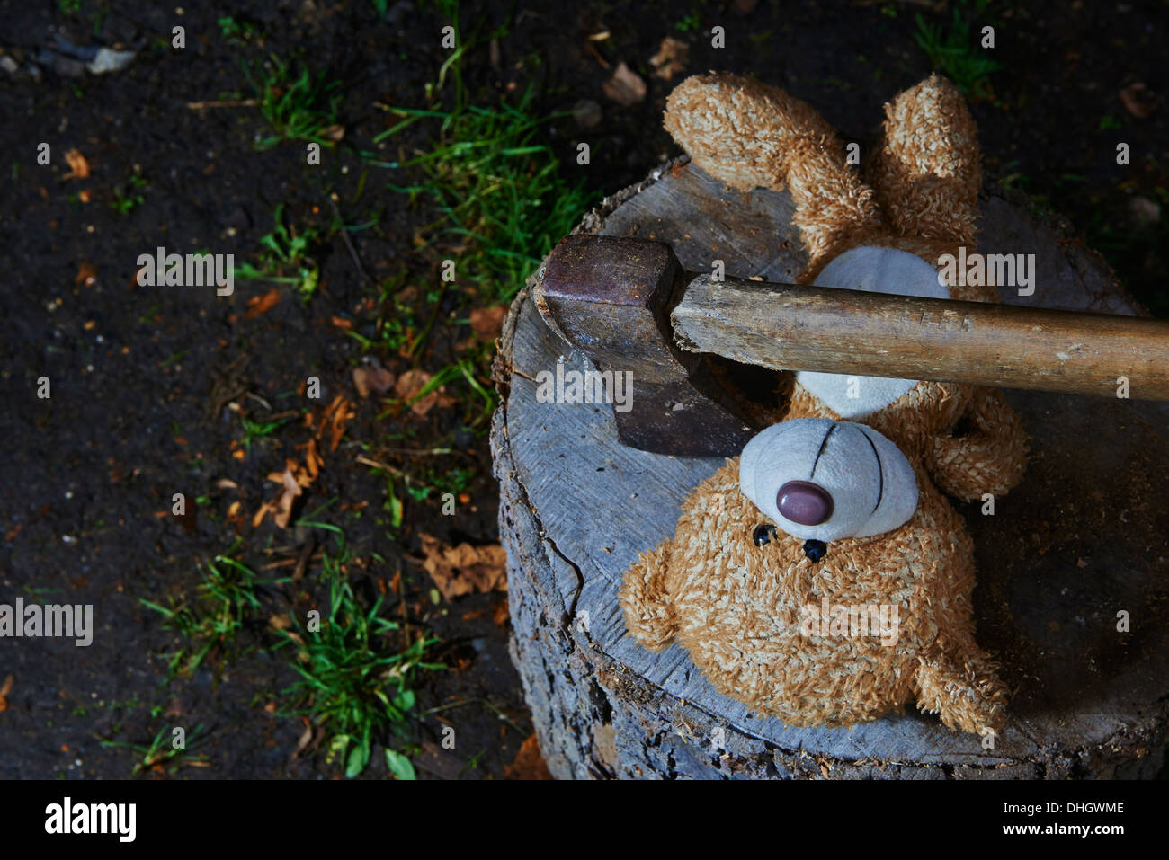 Execution of child toy teddy bear with an ax Stock Photo - Alamy