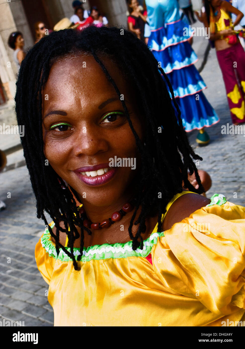 Young Cuban woman smiling in the streets of Havana near Plaza de Armas ...