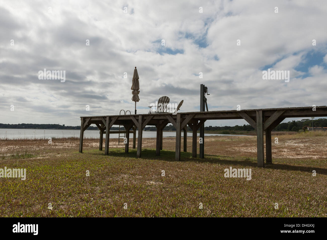 A Dock on Lake Silver in Leesburg, Central Florida shows the low water ...