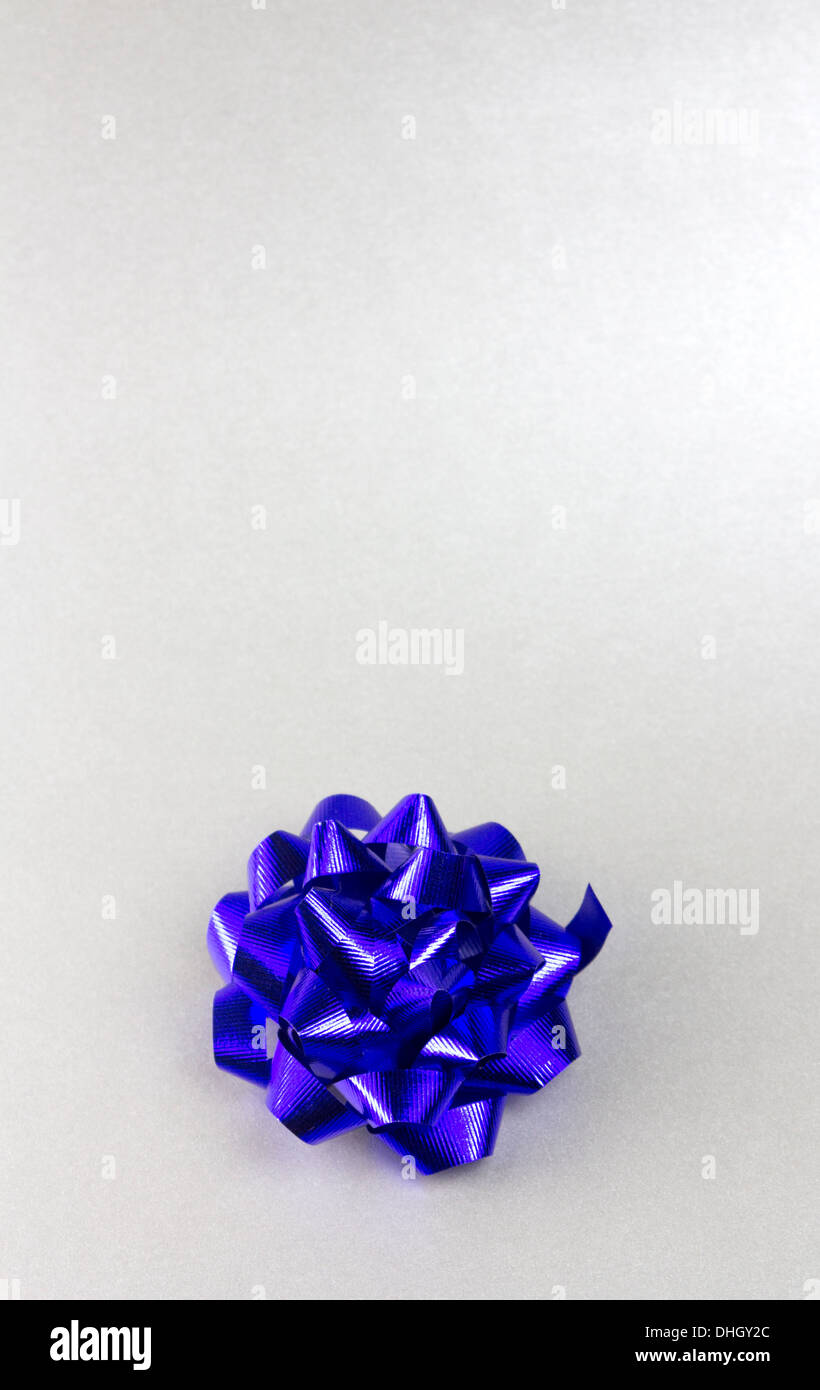 Blue ribbon on shine silver background Stock Photo - Alamy