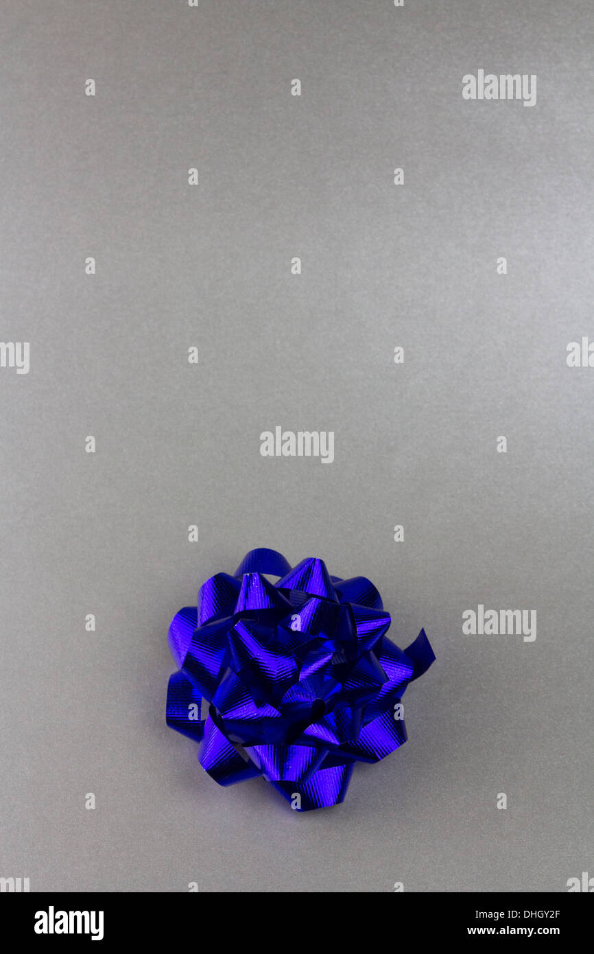 Blue ribbon on shine silver background Stock Photo - Alamy
