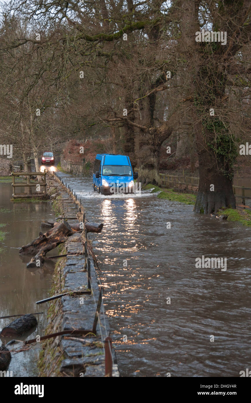Van driving through flood Stock Photo - Alamy