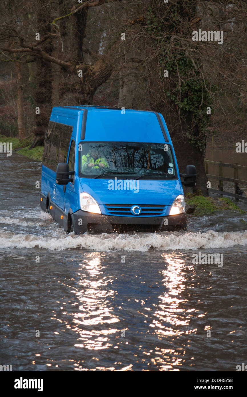 Van driving through flood Stock Photo - Alamy