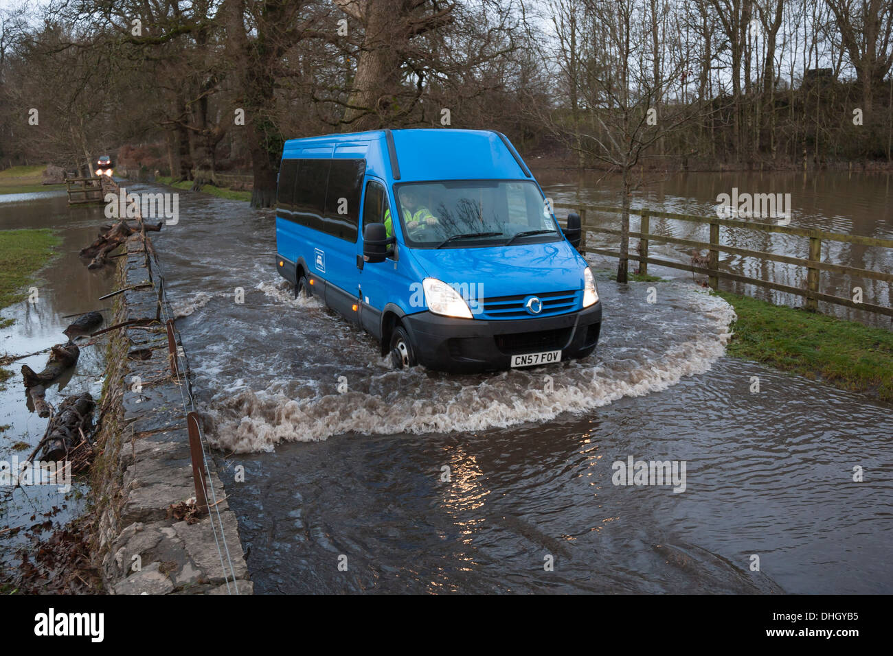 Van driving through flood Stock Photo - Alamy