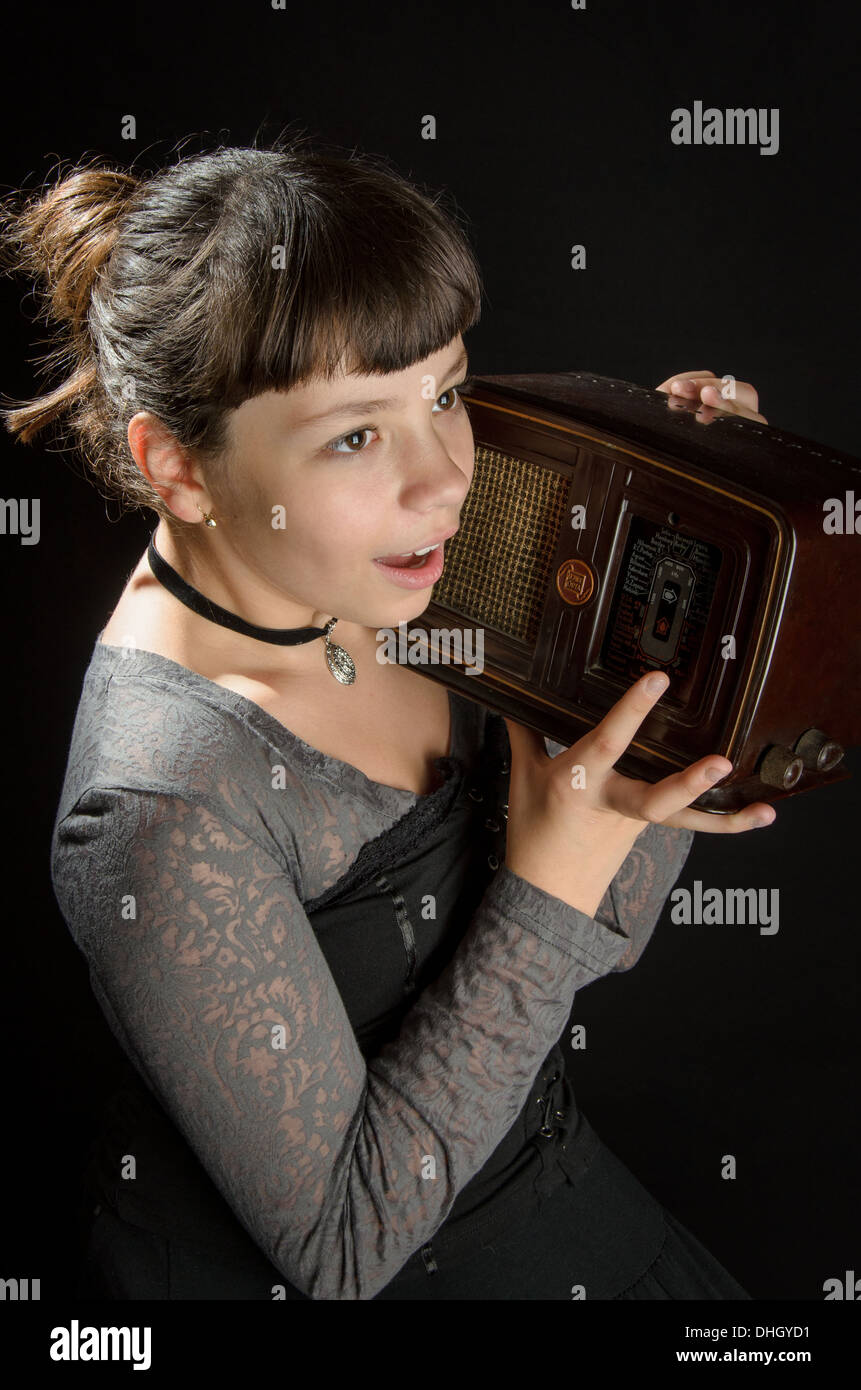 Vintage radio girl hi-res stock photography and images - Alamy