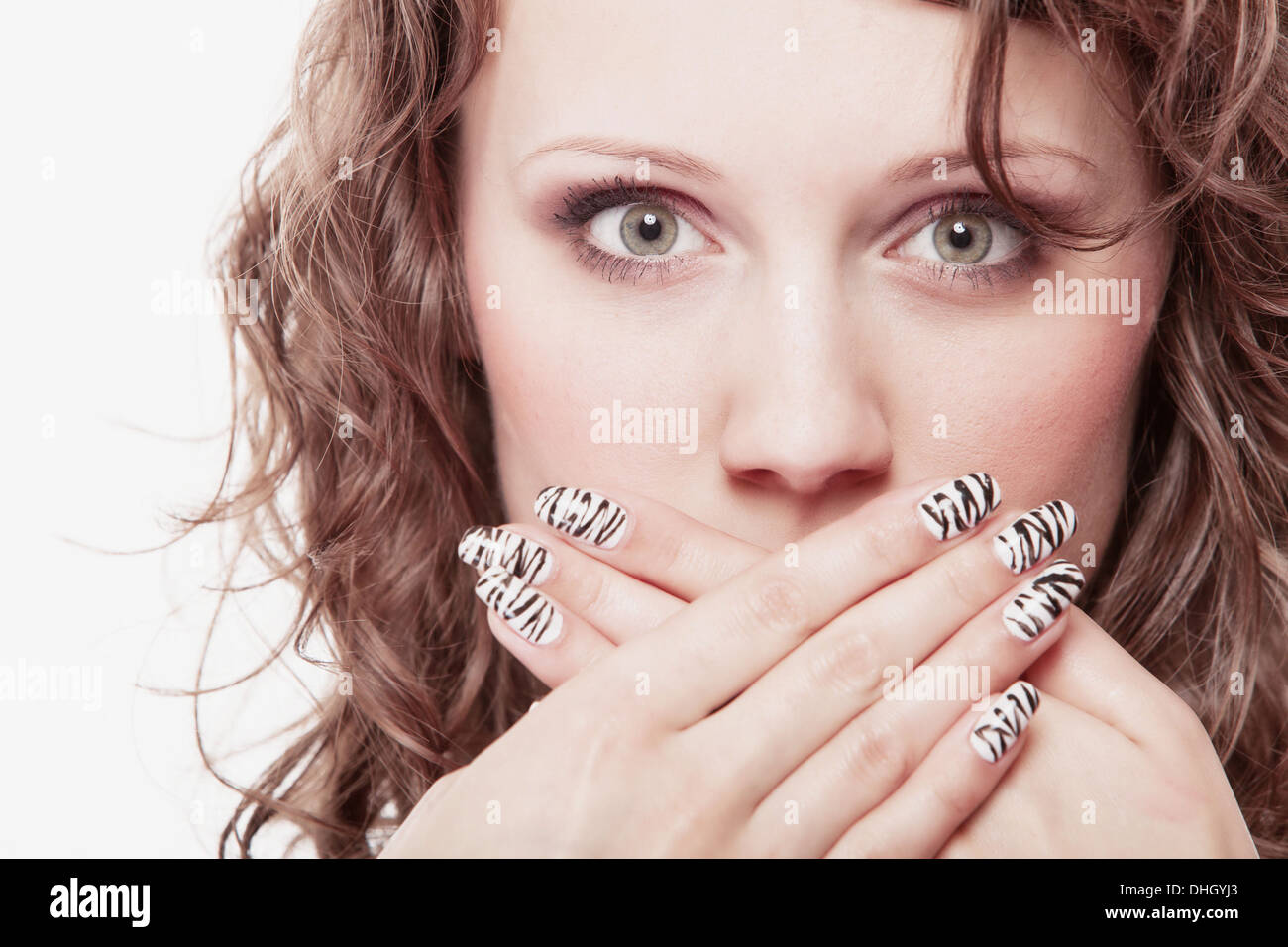 Speak no evil concept. Surprised woman face, girl covering her mouth ...