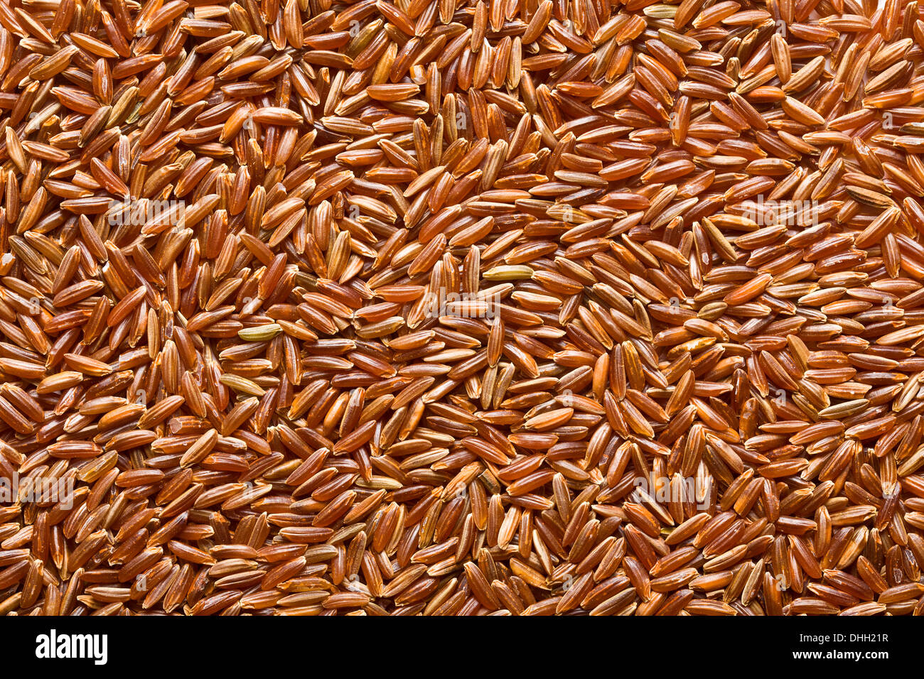 the texture of red raw rice Stock Photo - Alamy