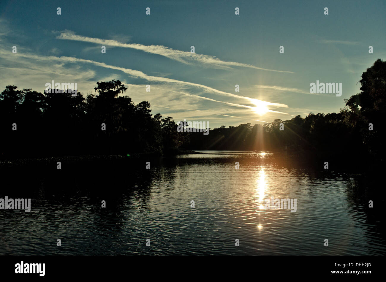 sunset over the swamp Stock Photo - Alamy