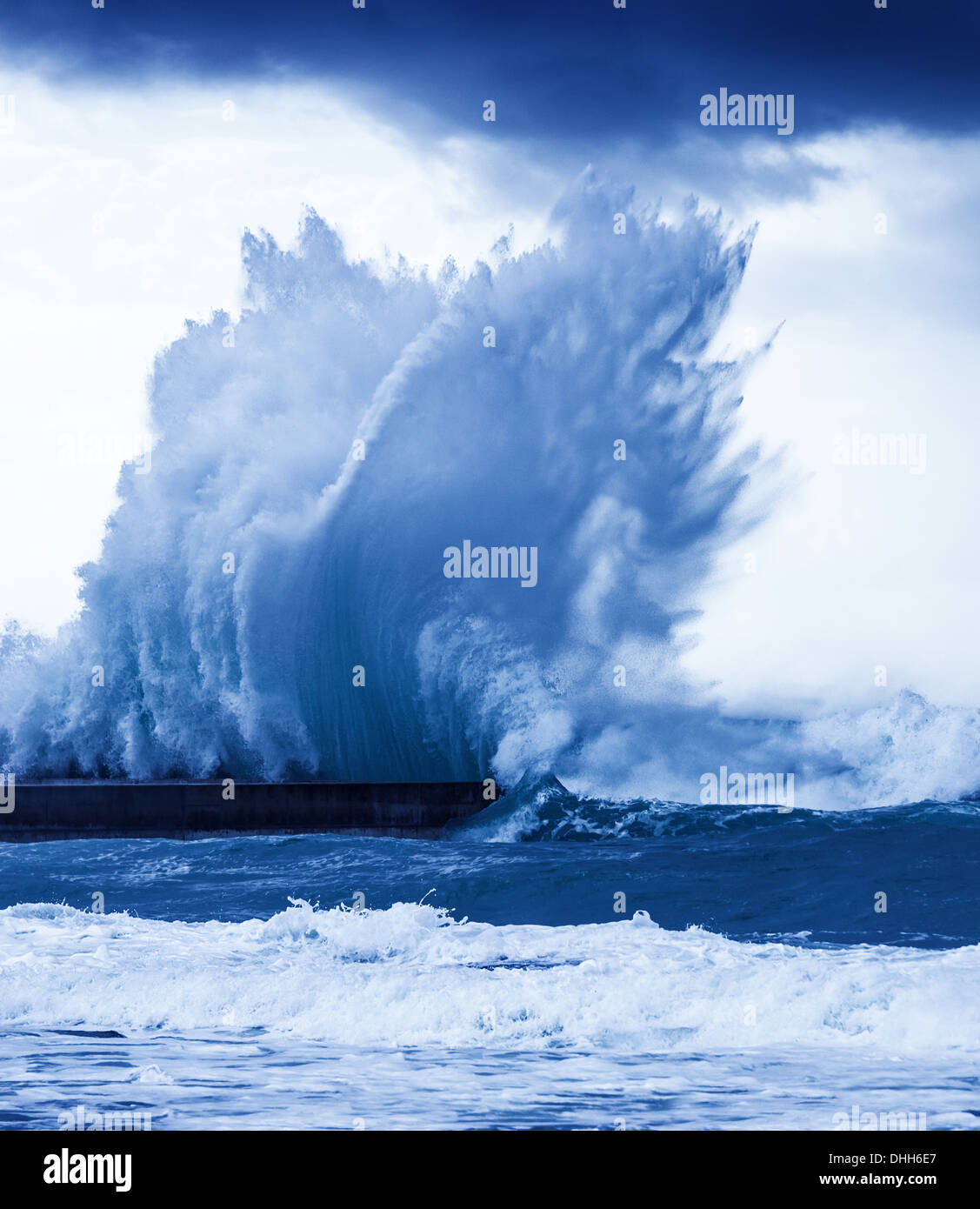 Giant wave splash, big powerful tide in action, storm weather in a deep ...