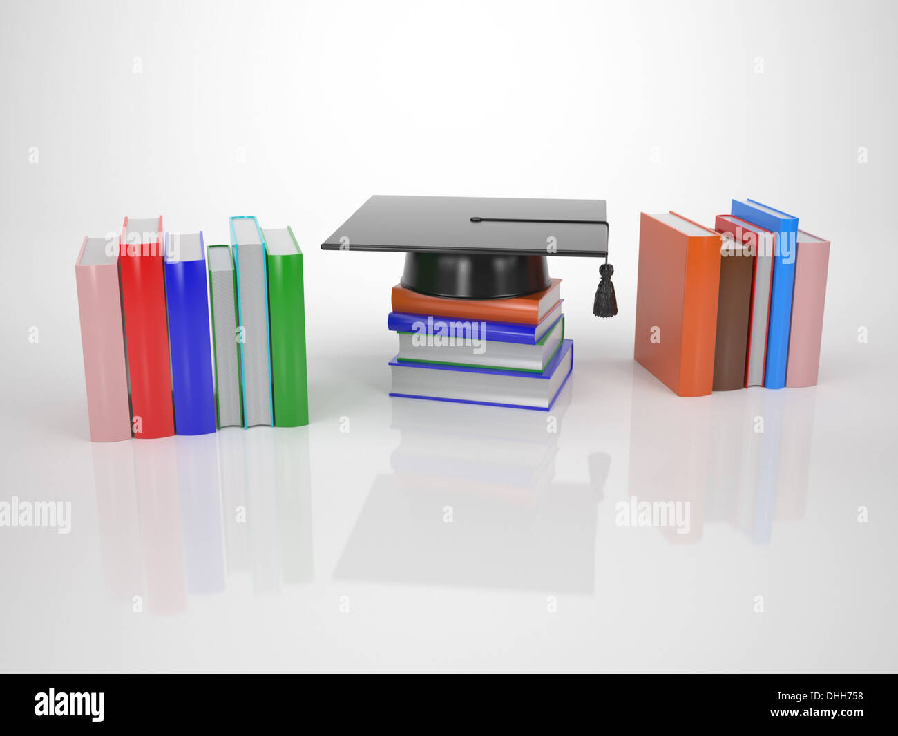Graduation Hat with Colored Books Stock Photo - Alamy