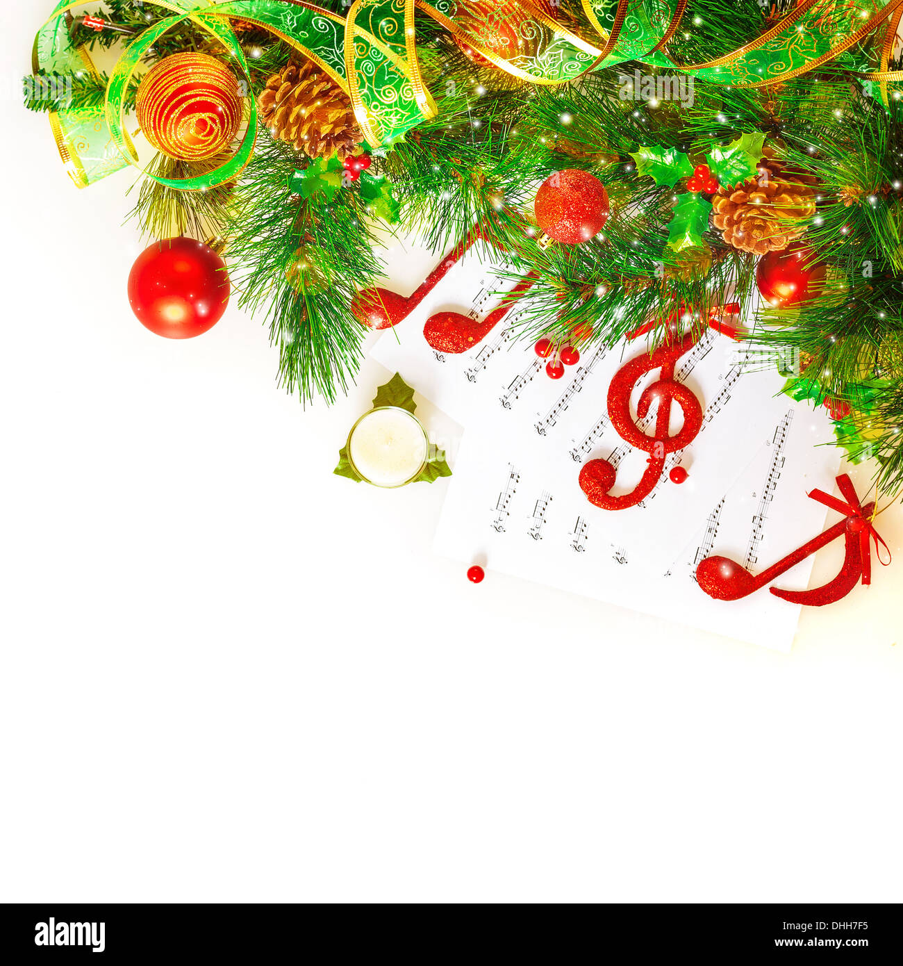 Festive musical still life, red treble clef and notes decorated fresh ...