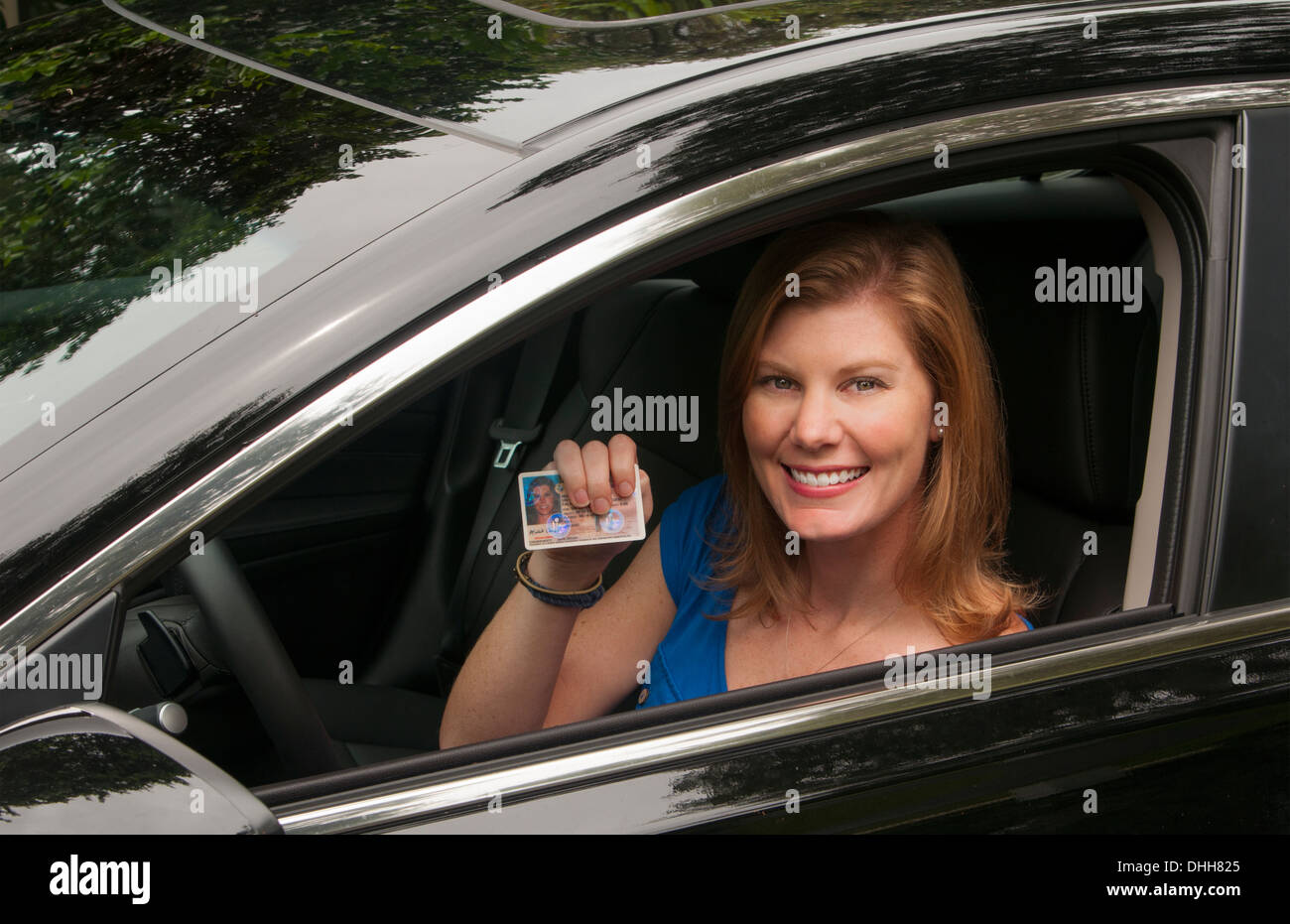 Teenage girl happy to be driving and finally getting her drivers ...