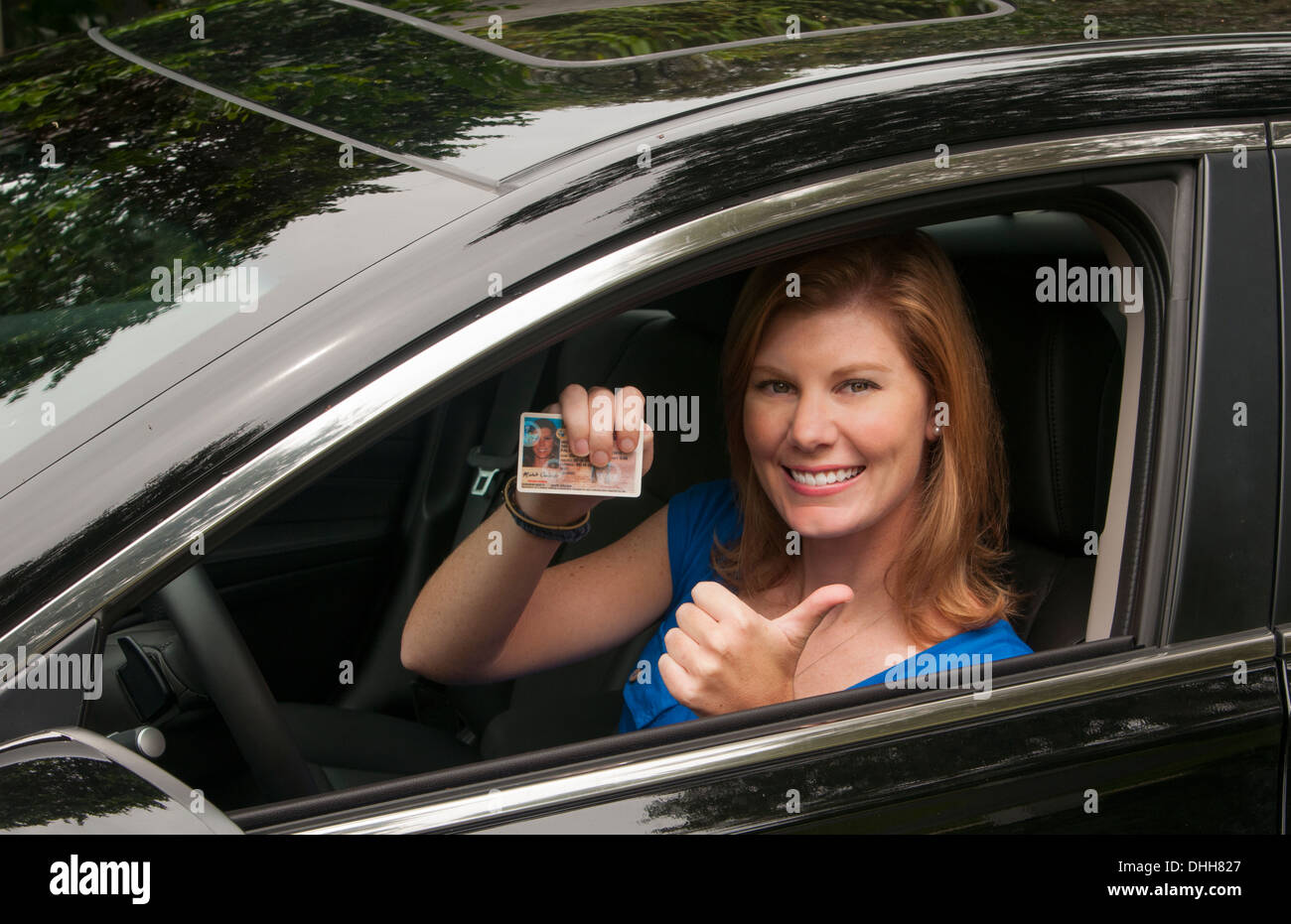 Teenage girl happy to be driving and finally getting her drivers ...