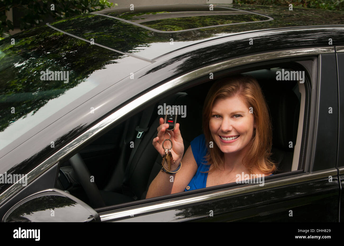 Teenage girl happy to be driving and finally getting her drivers ...