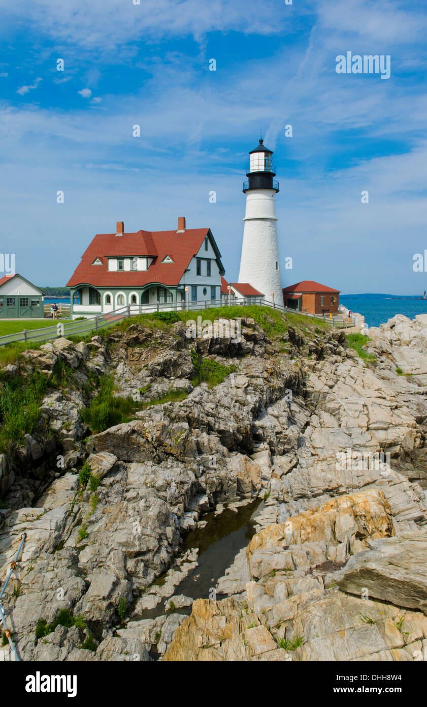 Portland Maine famous Head Light Lighthouse in USA on water with rocks ...