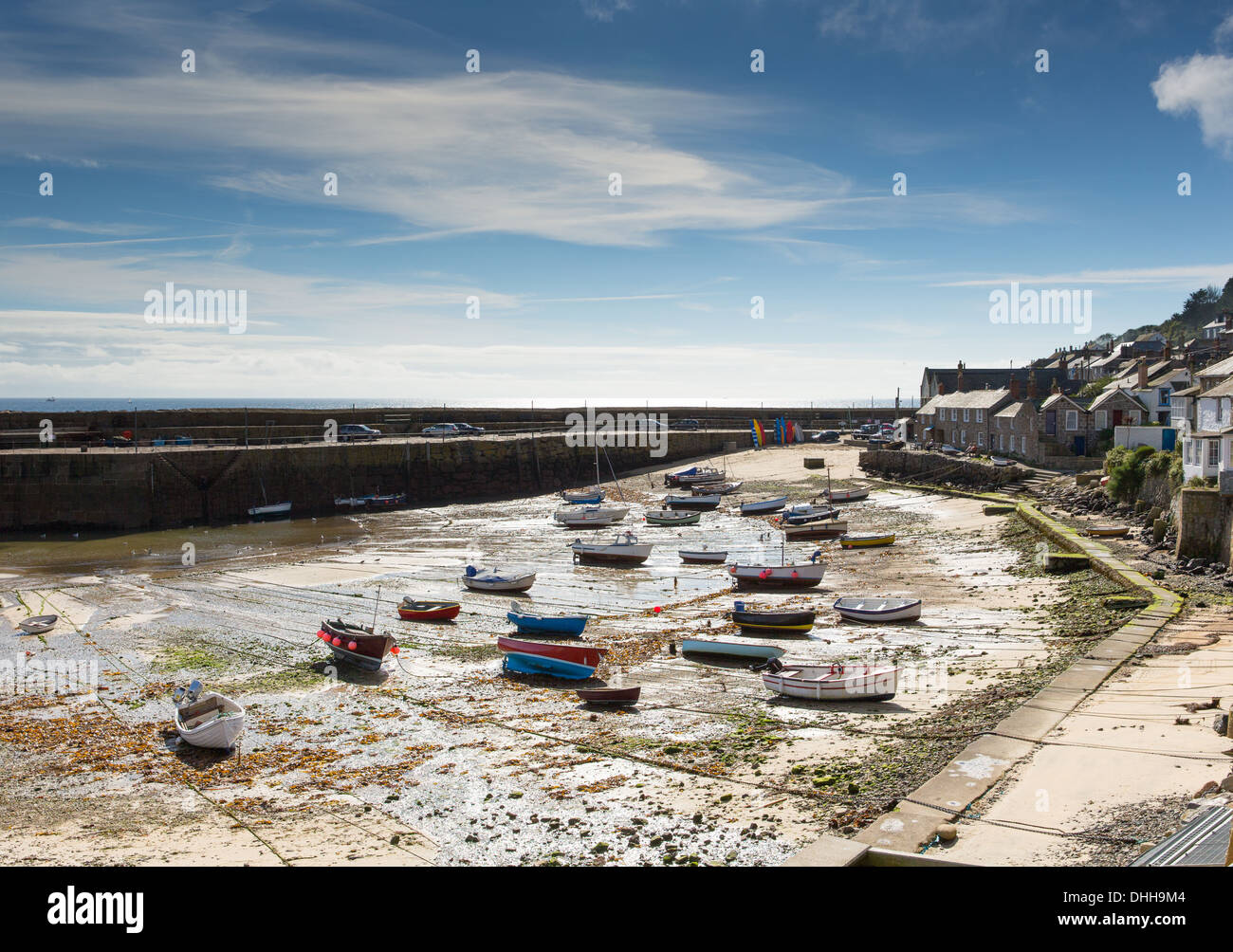 Boats in Mousehole harbour Cornwall England Cornish fishing village ...